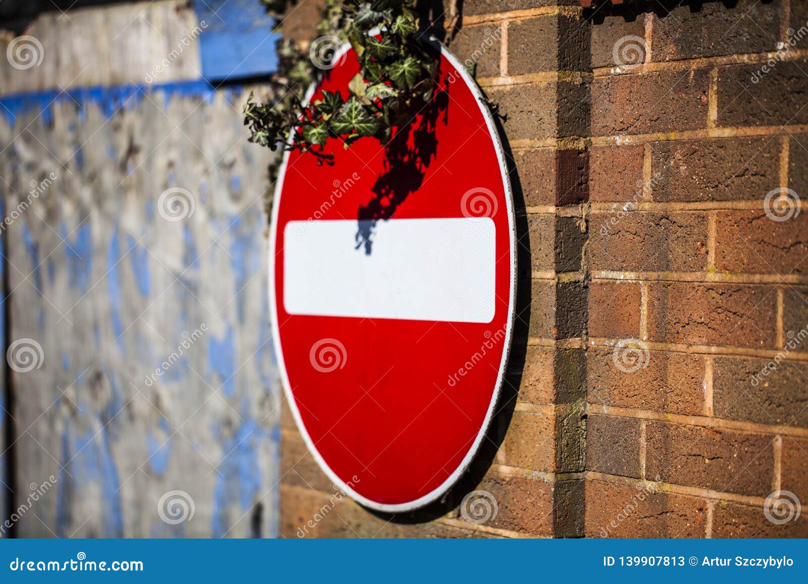 One Way Round Sign on the Wall. Traffic Signs on the Wall. Concept of ...