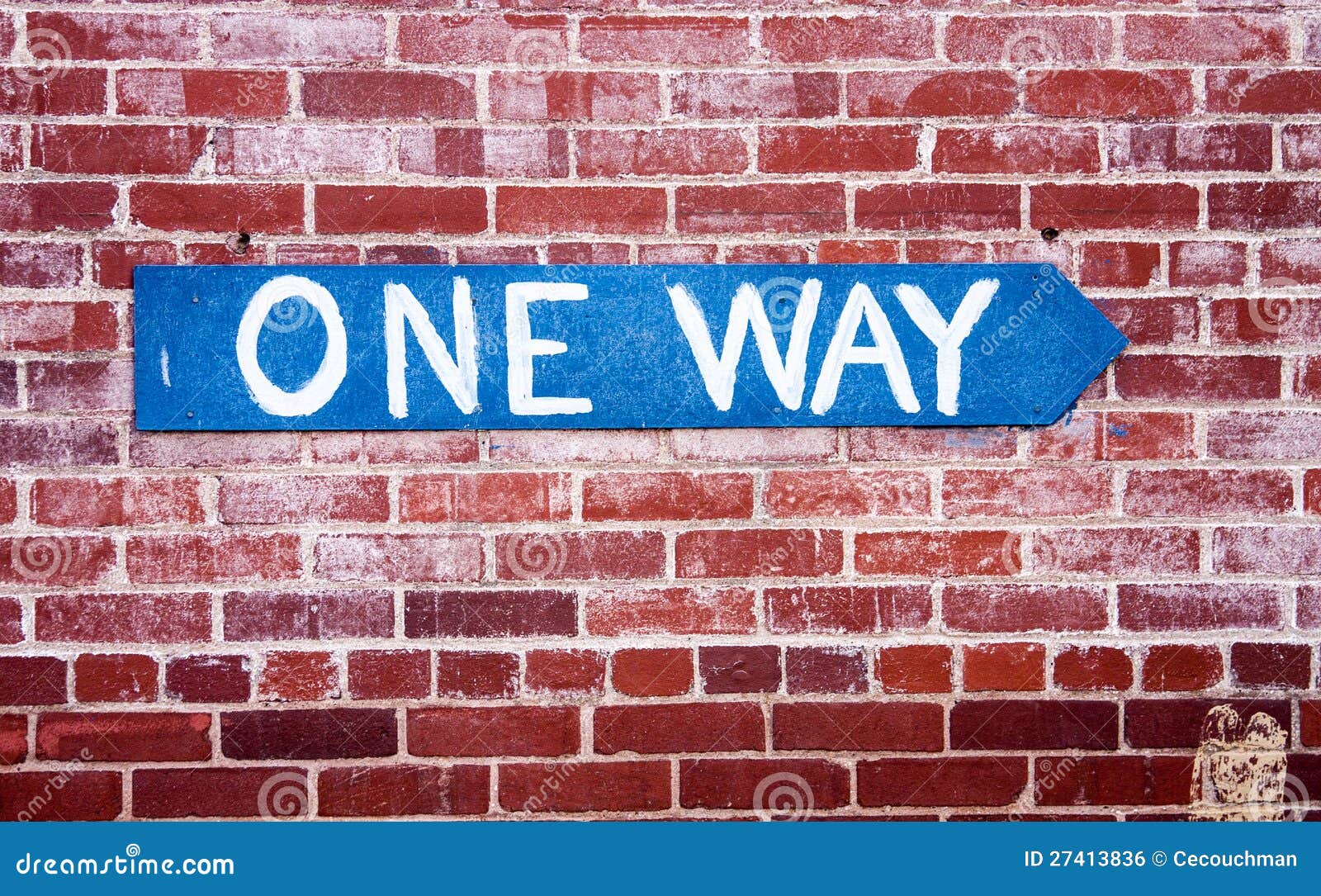 One-Way Sign on Brick Wall stock photo. Image of architecture - 27413836