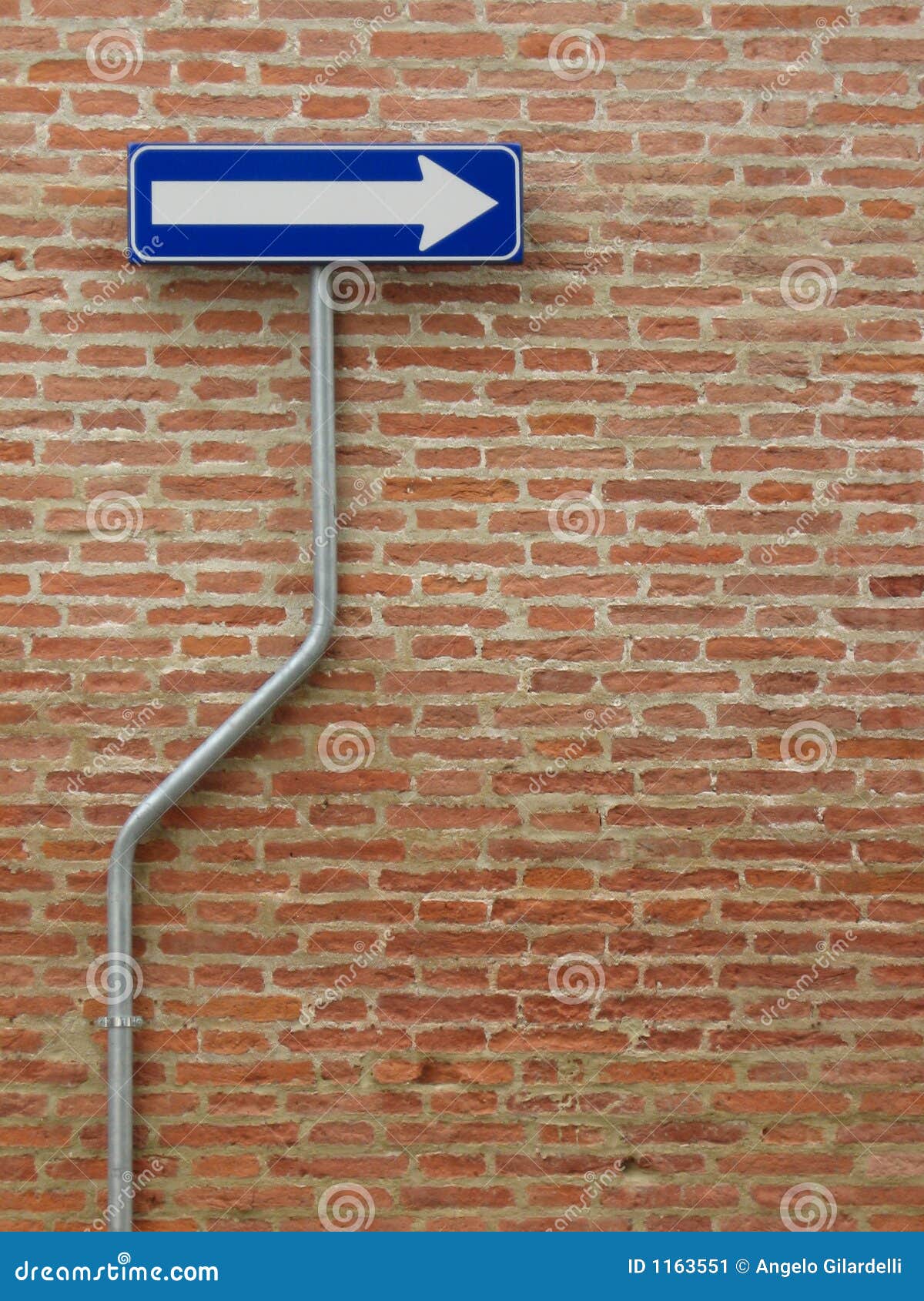 One Way Sign Over a Bricks Wall Stock Image - Image of travel, turn ...