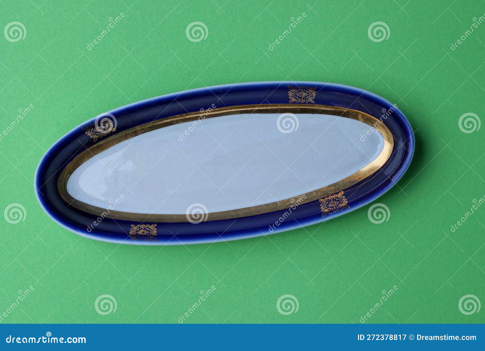 One White Empty Ceramic Oval Plate with a Yellow Pattern Stock Image ...
