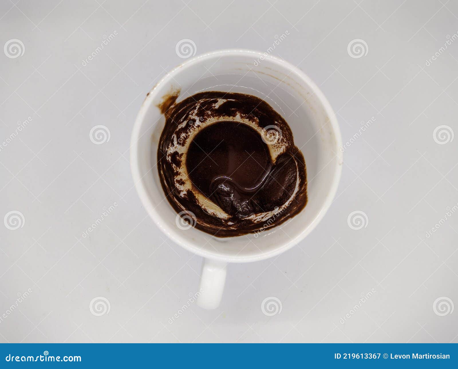 One White Empty Cup of Custard Coffee on a White Background Top View ...