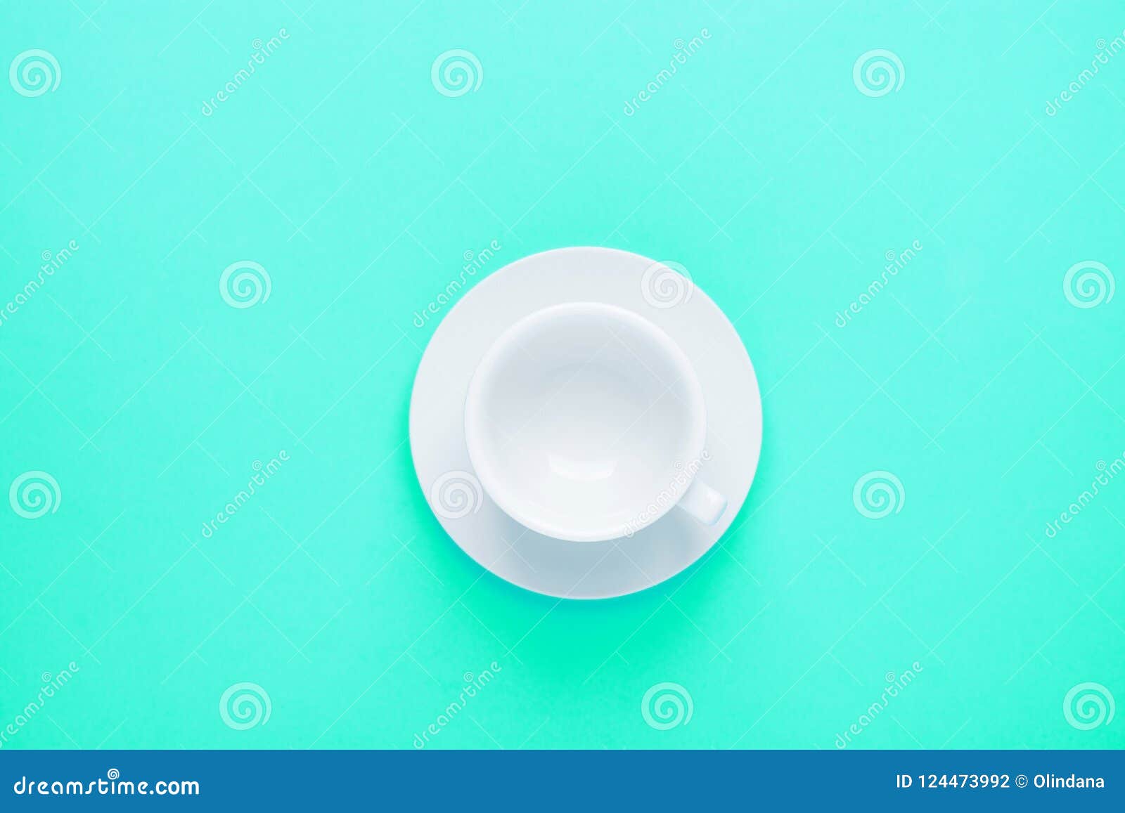 One White Empty Tea or Coffee Cup with Saucer on Light Blue Background ...