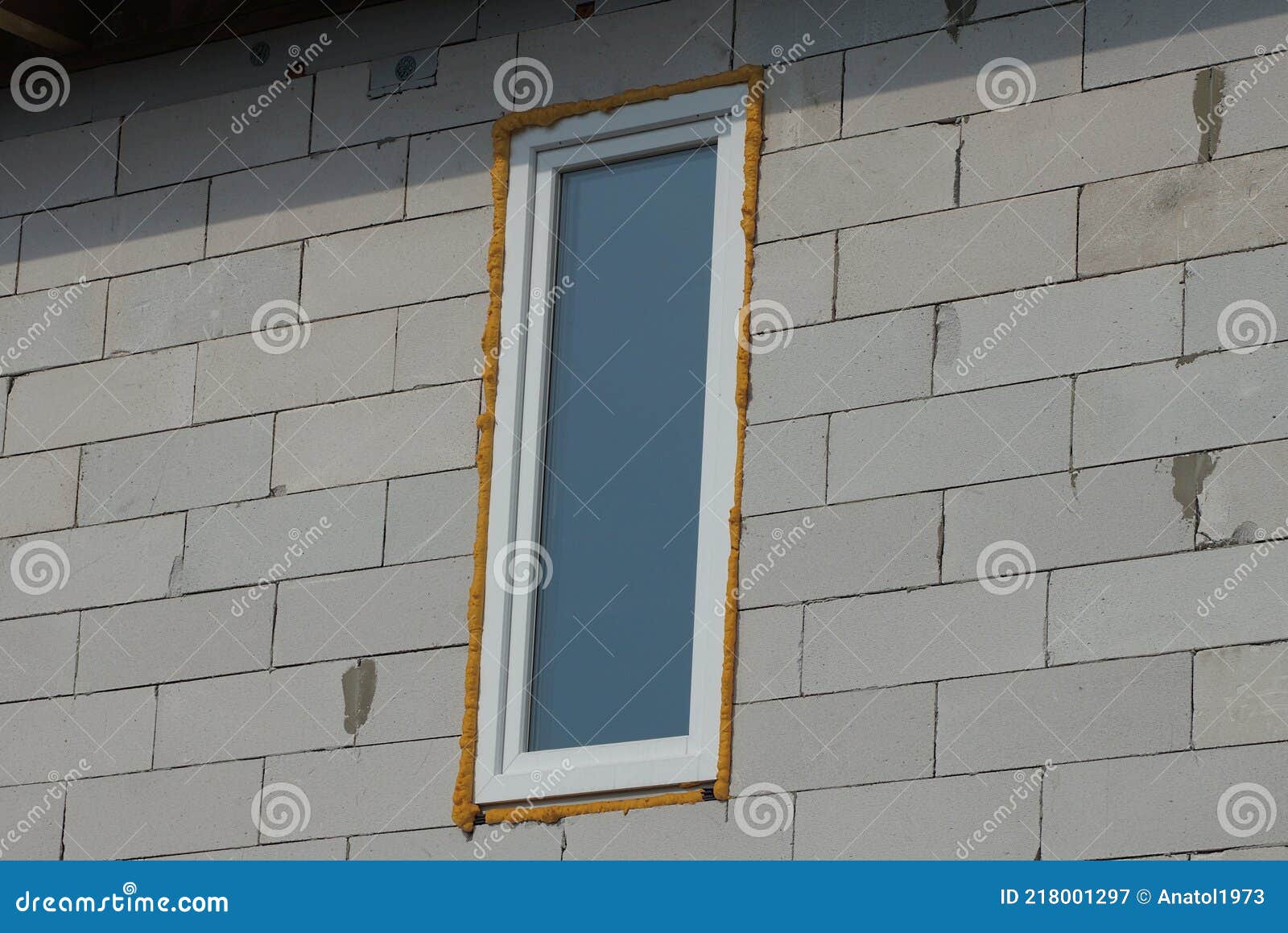 One White Rectangular Window on a Gray Brick Wall Stock Image - Image ...