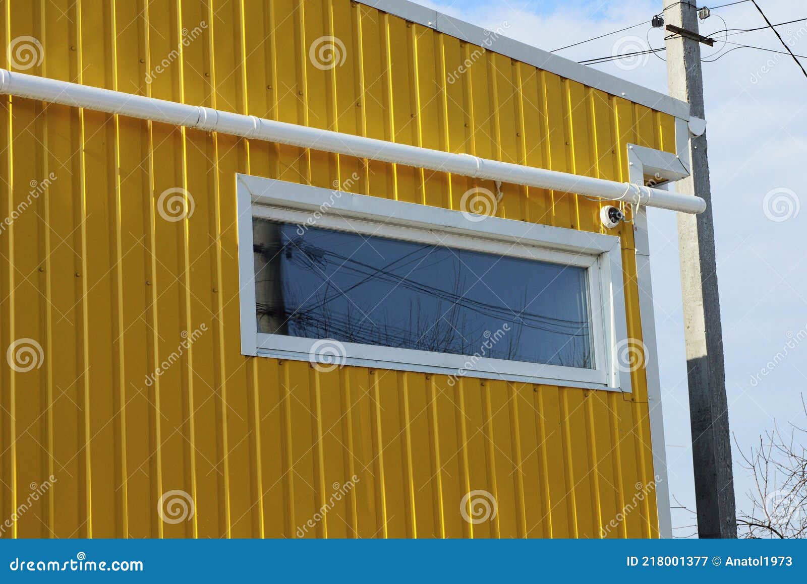 One White Rectangular Window on a Yellow Metal Wall Stock Image - Image ...