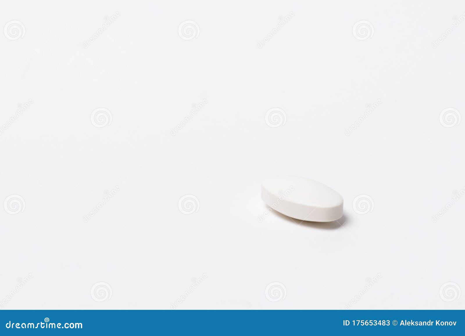 One White Tablet Oval Shaped on a White Background Stock Image - Image ...