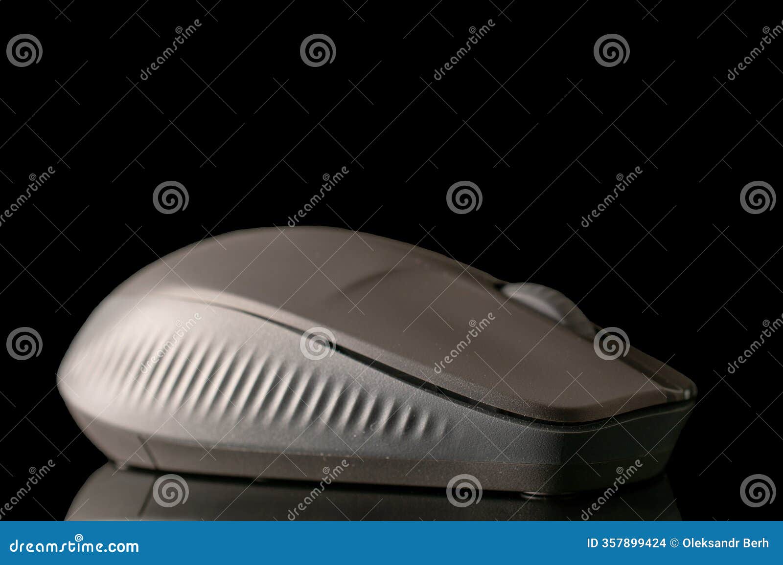 One Wireless Computer Mouse, Macro, Isolated on a Black Background ...
