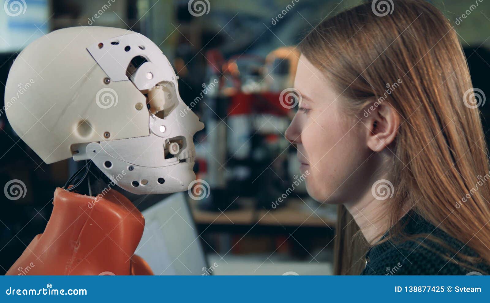 Female Engineer Looks at a Droid Working, Side View. Stock Video ...
