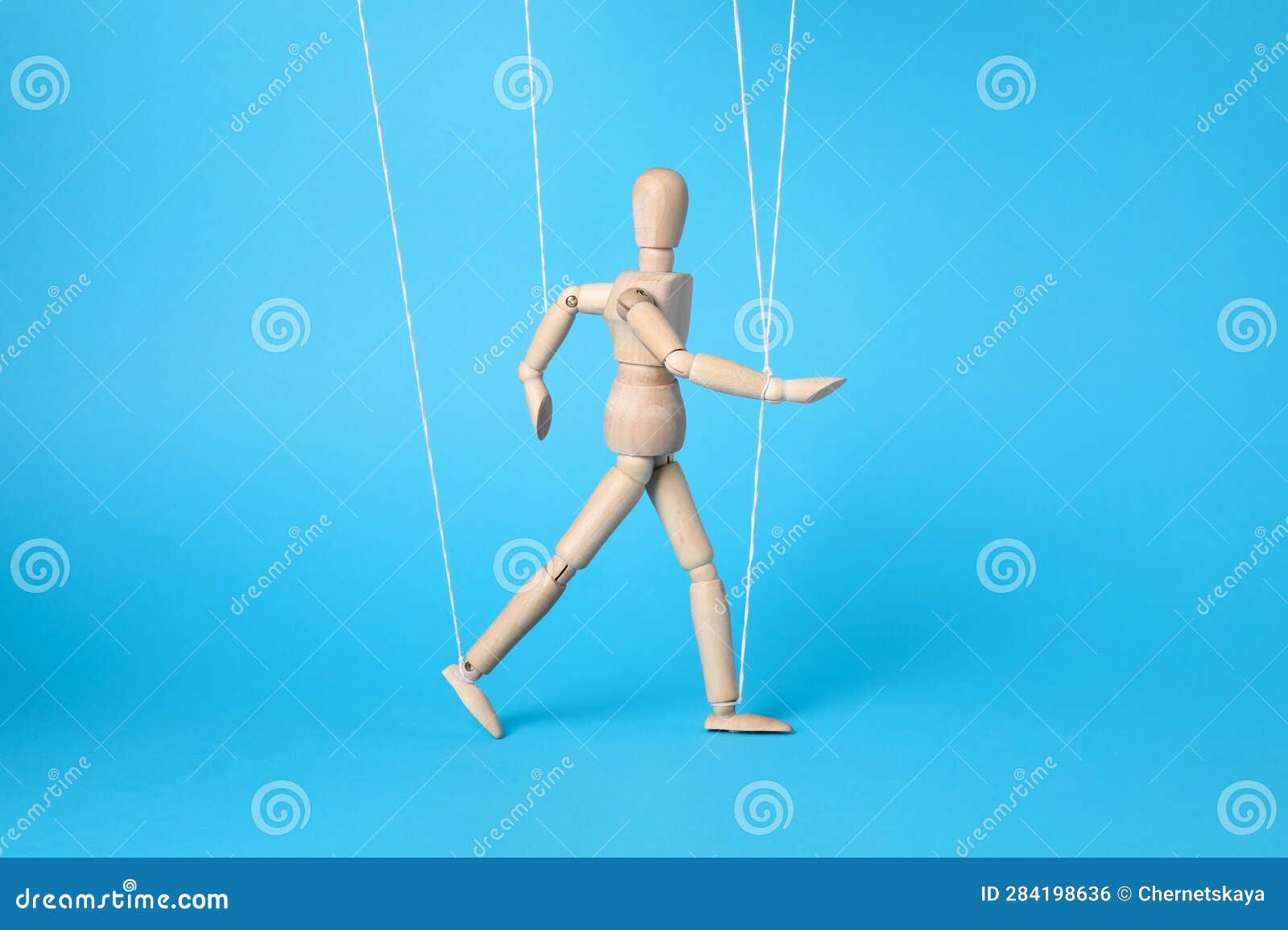 One Wooden Puppet with Strings on Light Blue Background Stock Photo ...