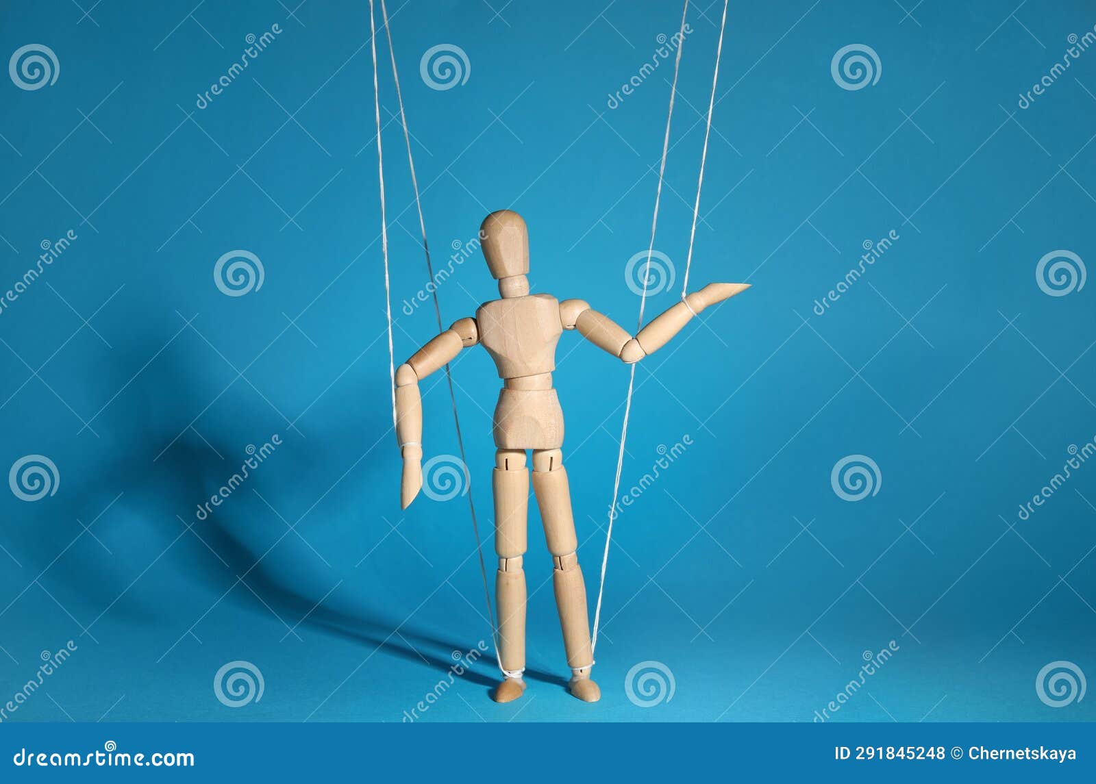 One Wooden Puppet with Strings on Light Blue Background Stock Photo ...