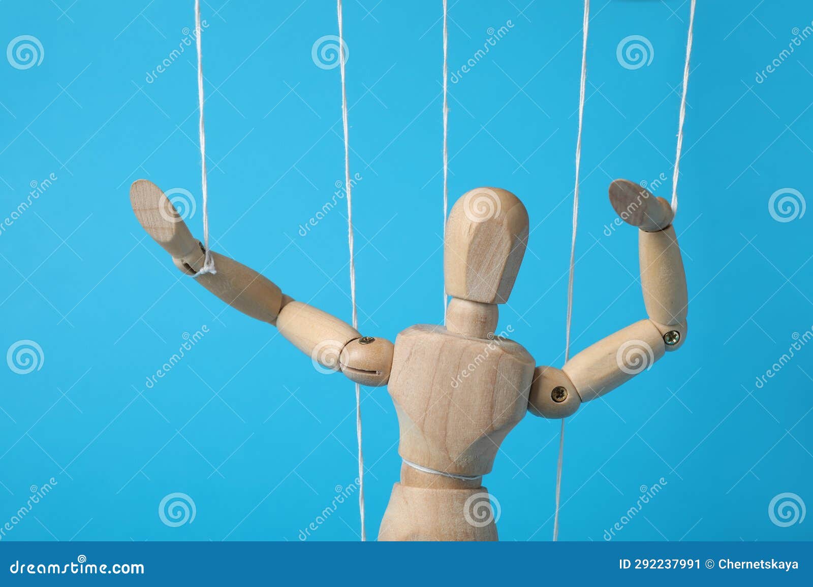 One Wooden Puppet with Strings on Light Blue Background Stock Image ...