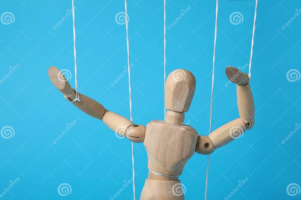 One Wooden Puppet with Strings on Light Blue Background Stock Image ...