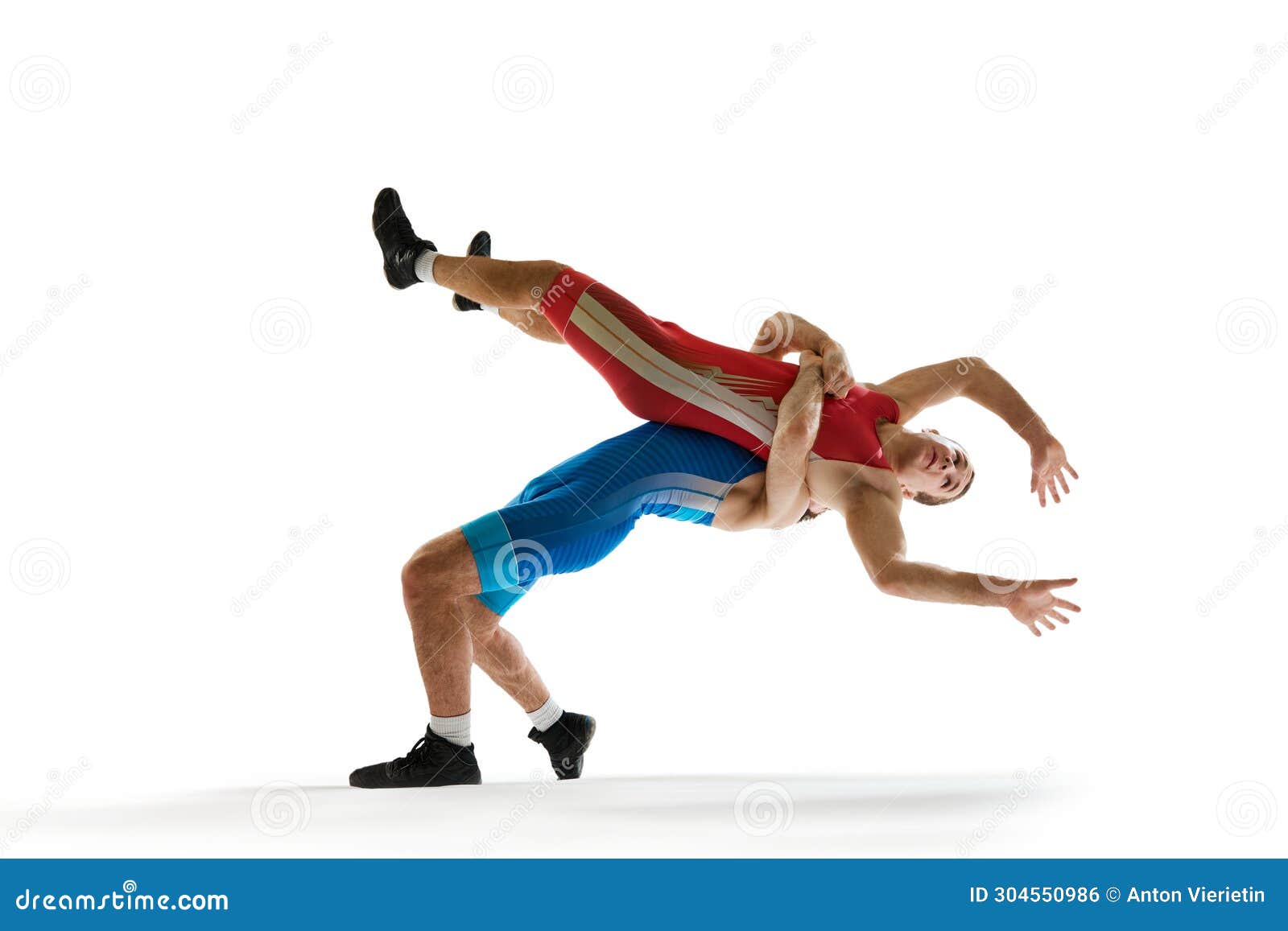 One Wrestler in Red Uniform Thrown by Opponent in Blue, Both Captured ...