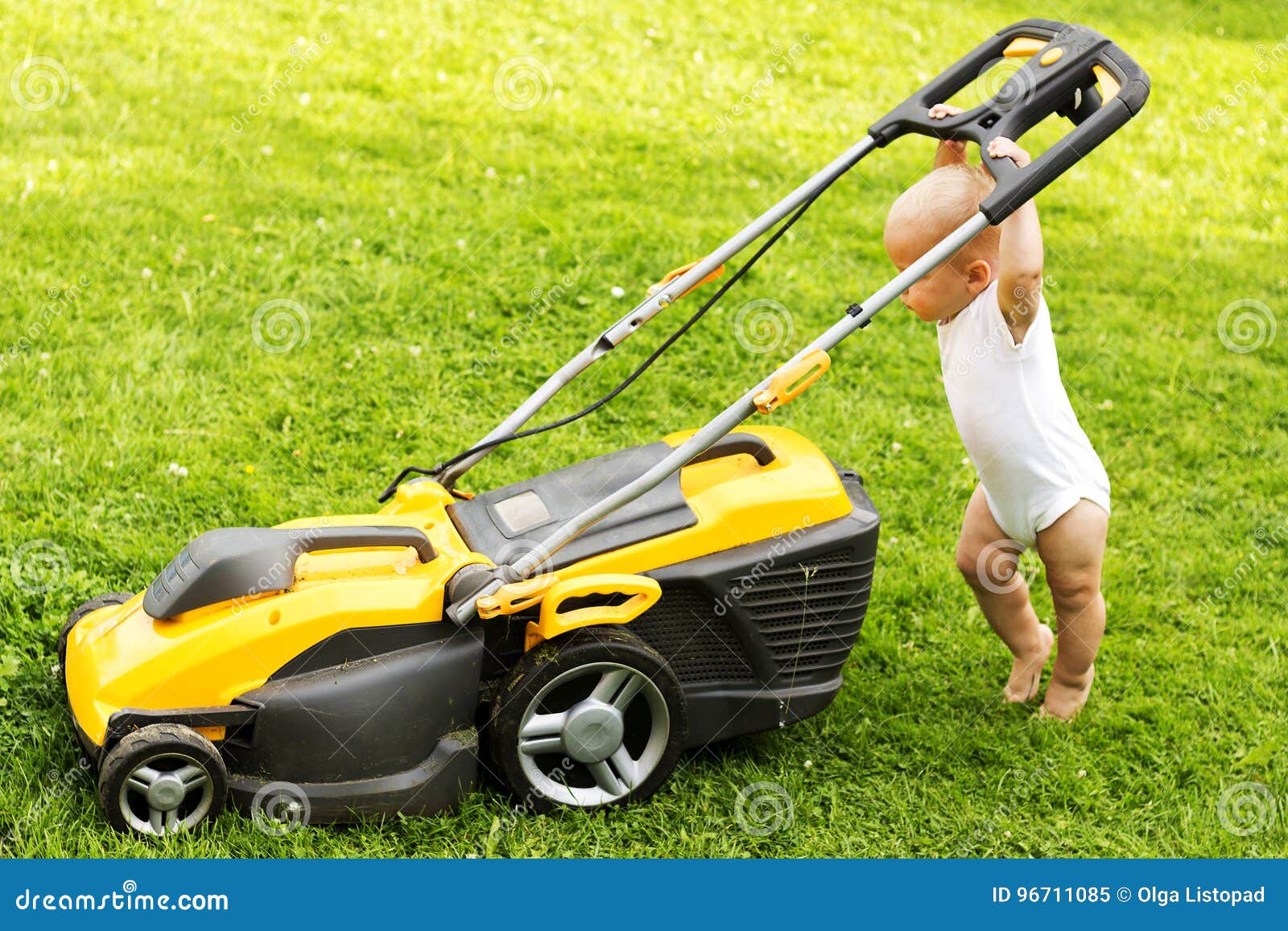 One Year Kid Grinding the Grass with a Grassmower Stock Image - Image ...
