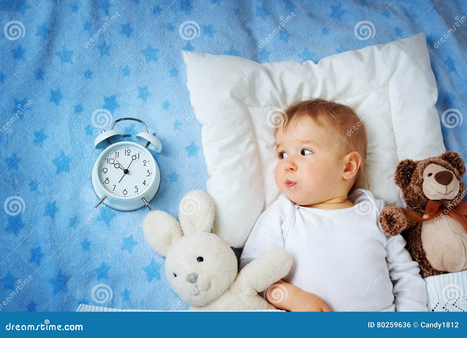 One Year Old Baby with Alarm Clock Stock Photo - Image of bedroom ...