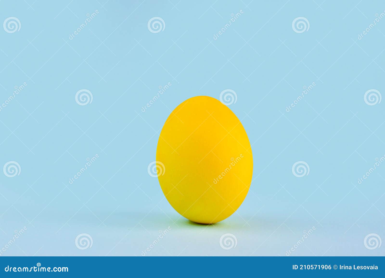 One Yellow Egg on a Blue Background. Copy of the Space. Easter ...