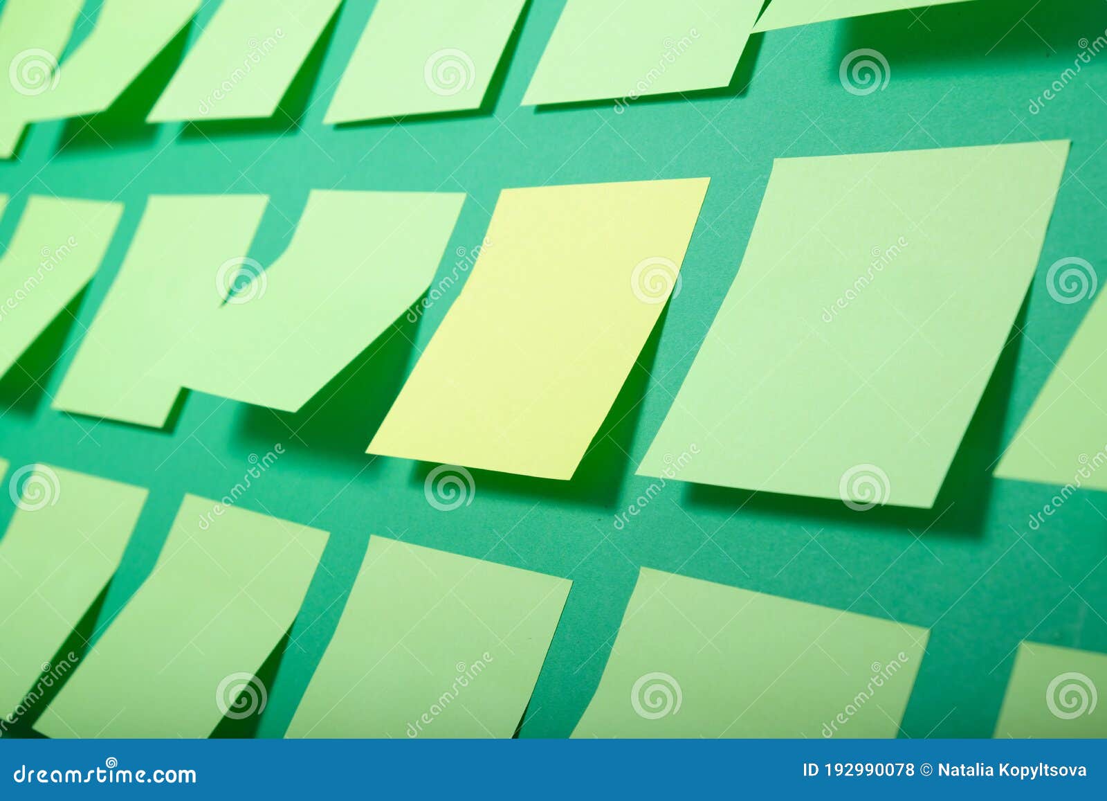 Many Light Green Sticky Notes on a Green Background, Selective Focus ...