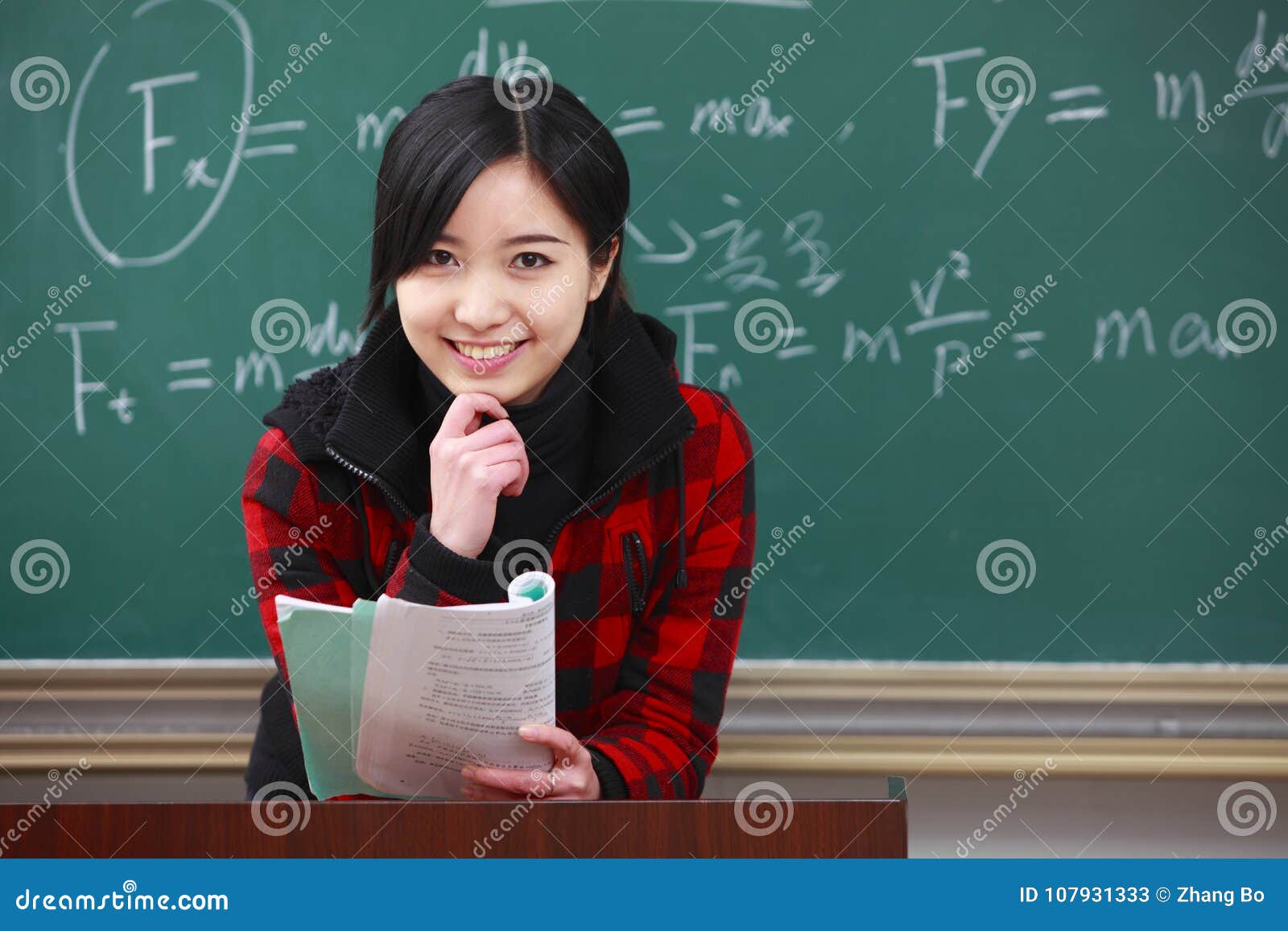 Asian Teacher Poses For Photograph 135272040