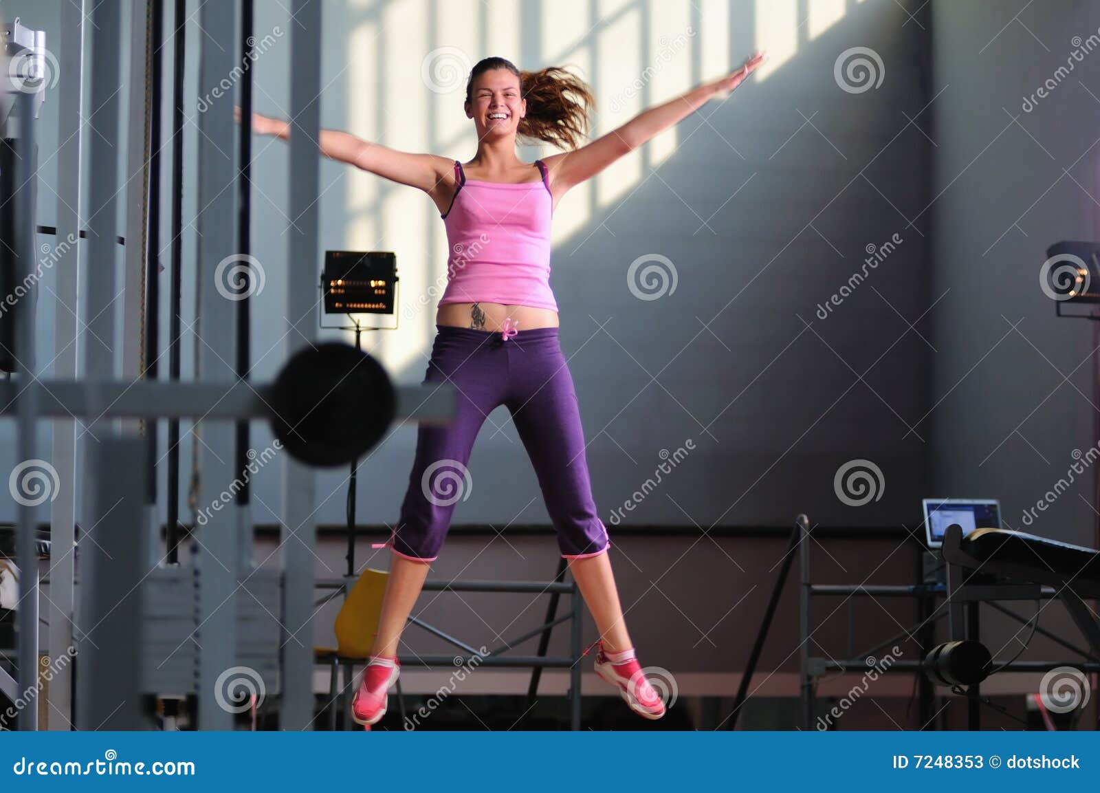 One young happy woman jump stock image. Image of fitness - 7248353