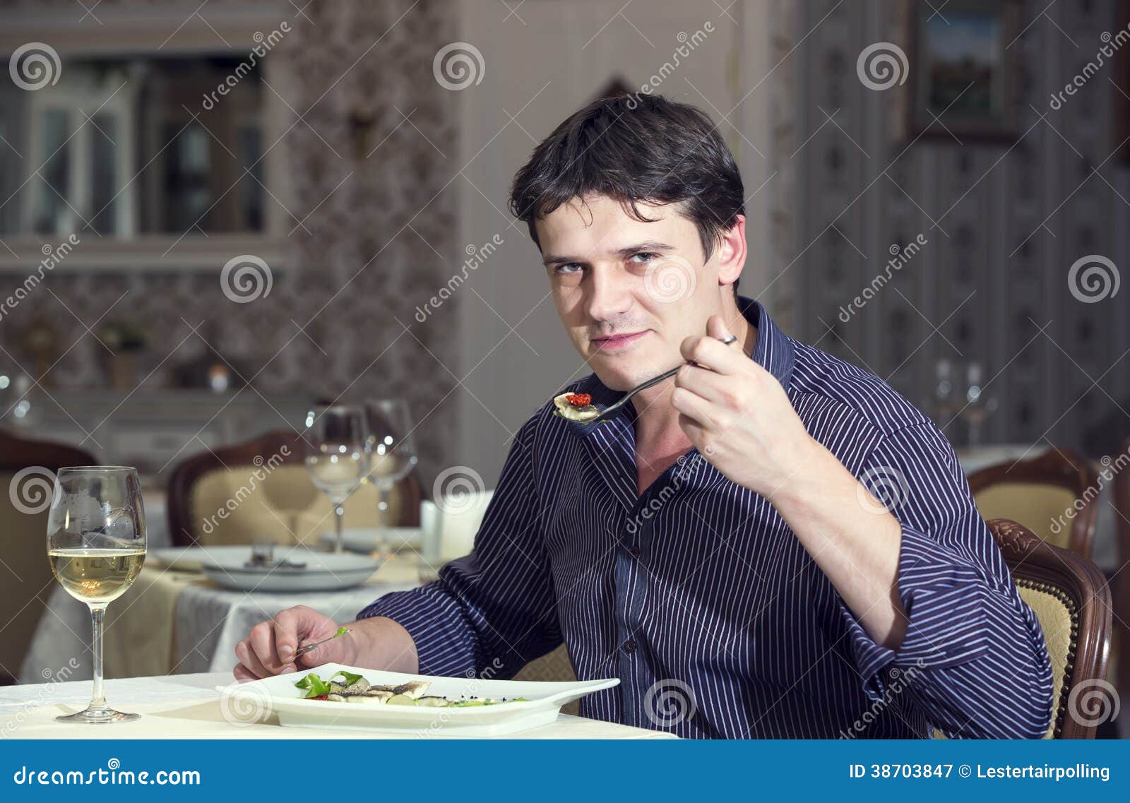 One young man dines stock image. Image of young, table - 38703847