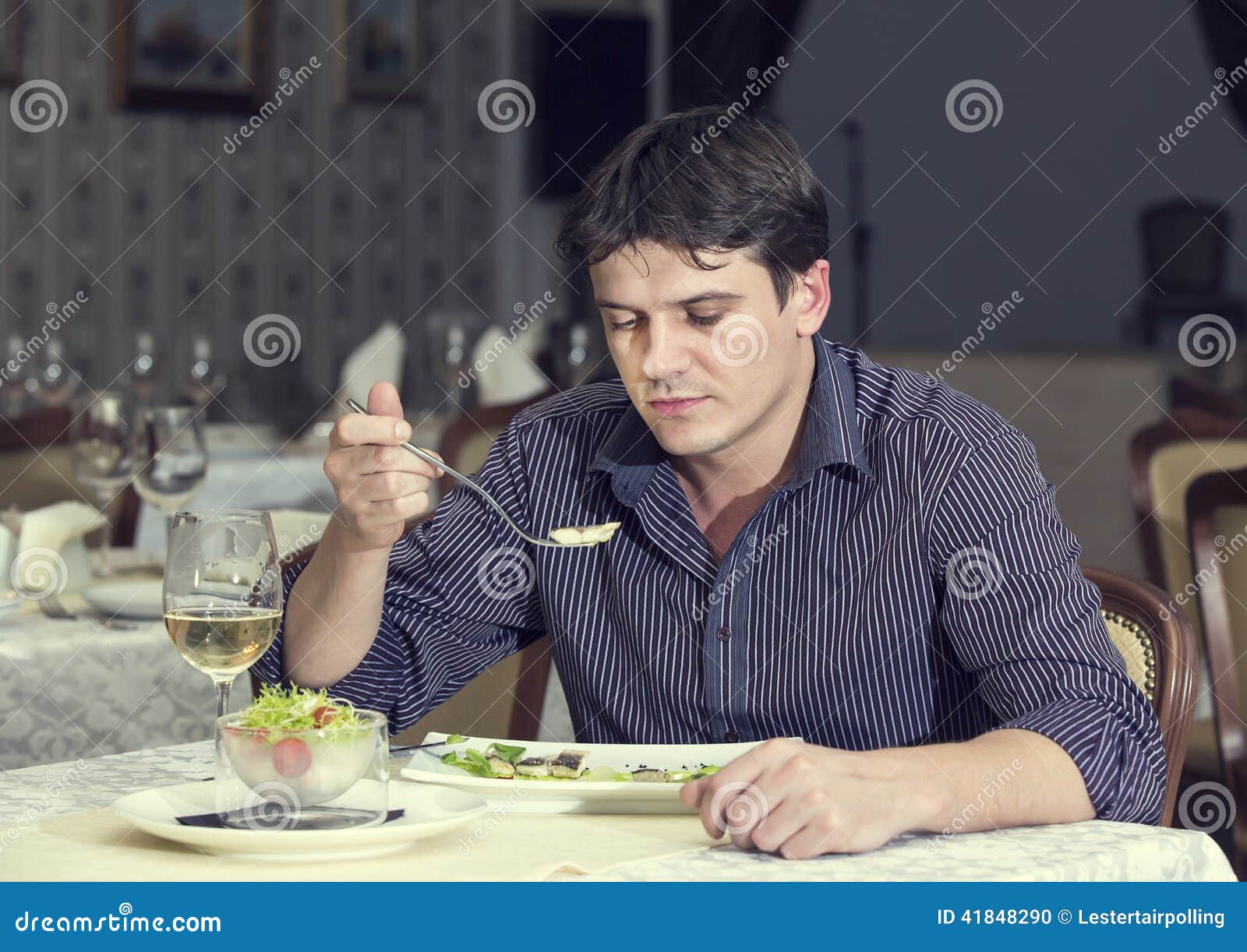 One young man dines stock photo. Image of glass, dinner - 41848290