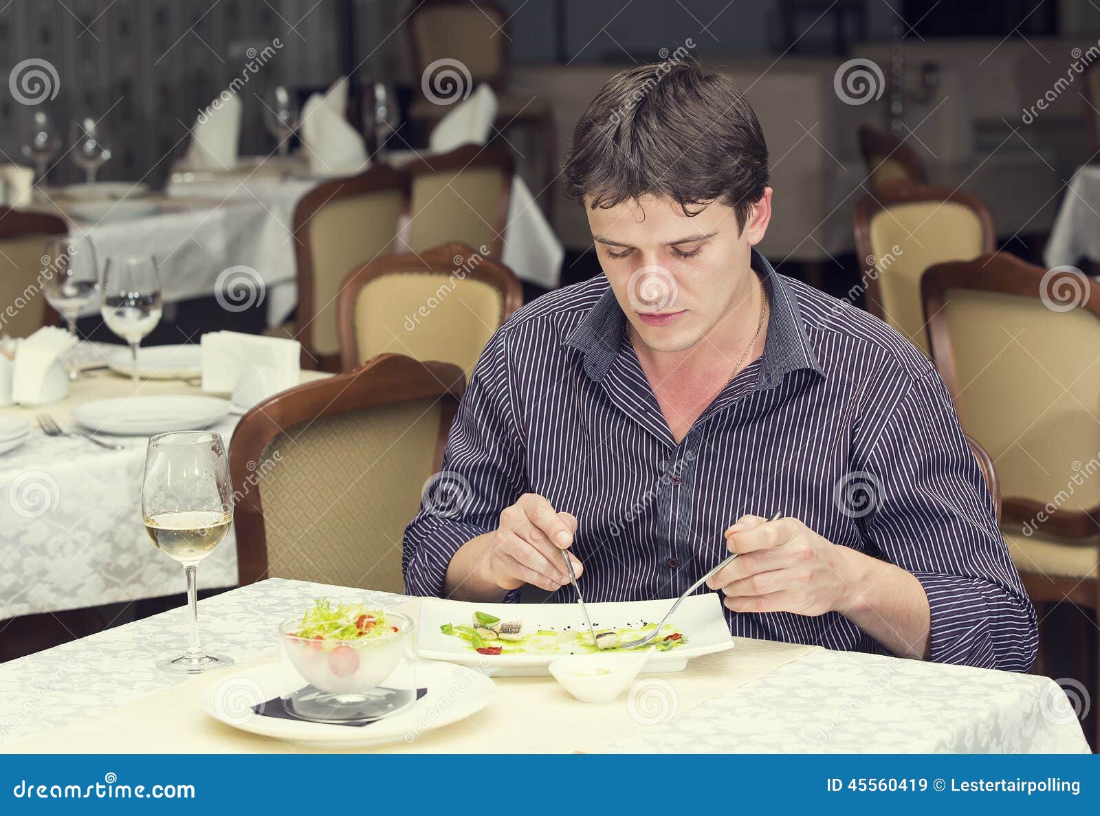 One young man dines stock image. Image of glass, date - 45560419
