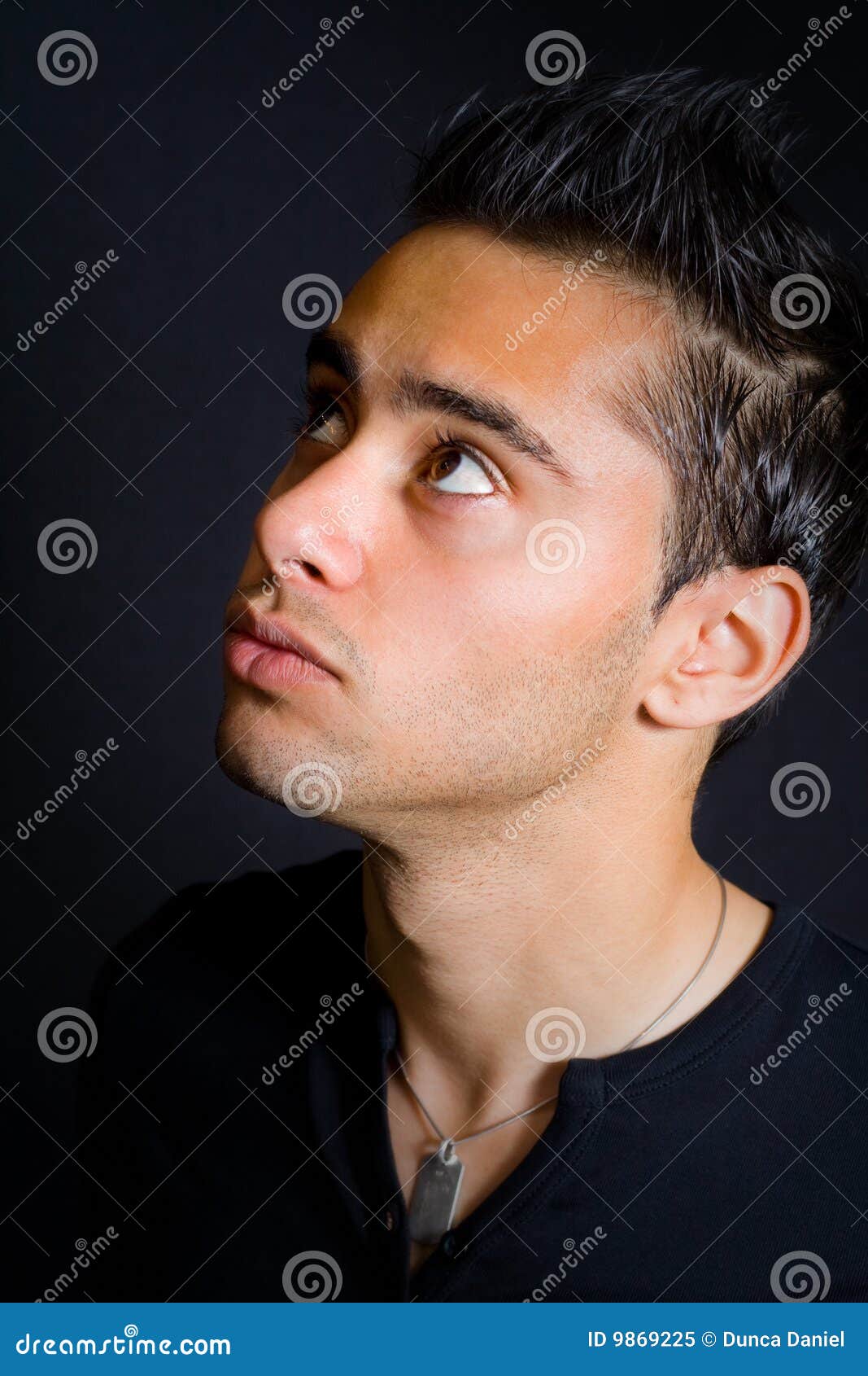 One Young Man Looking Up and Above Him Stock Image - Image of black ...