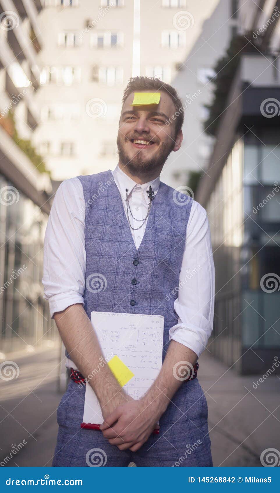 One Young Man Smiling with a Sticky Note on His Forehead Stock Photo ...