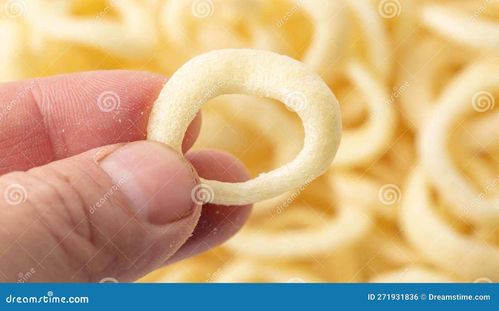 Onion ring chips in hand. stock photo. Image of rings - 271931836