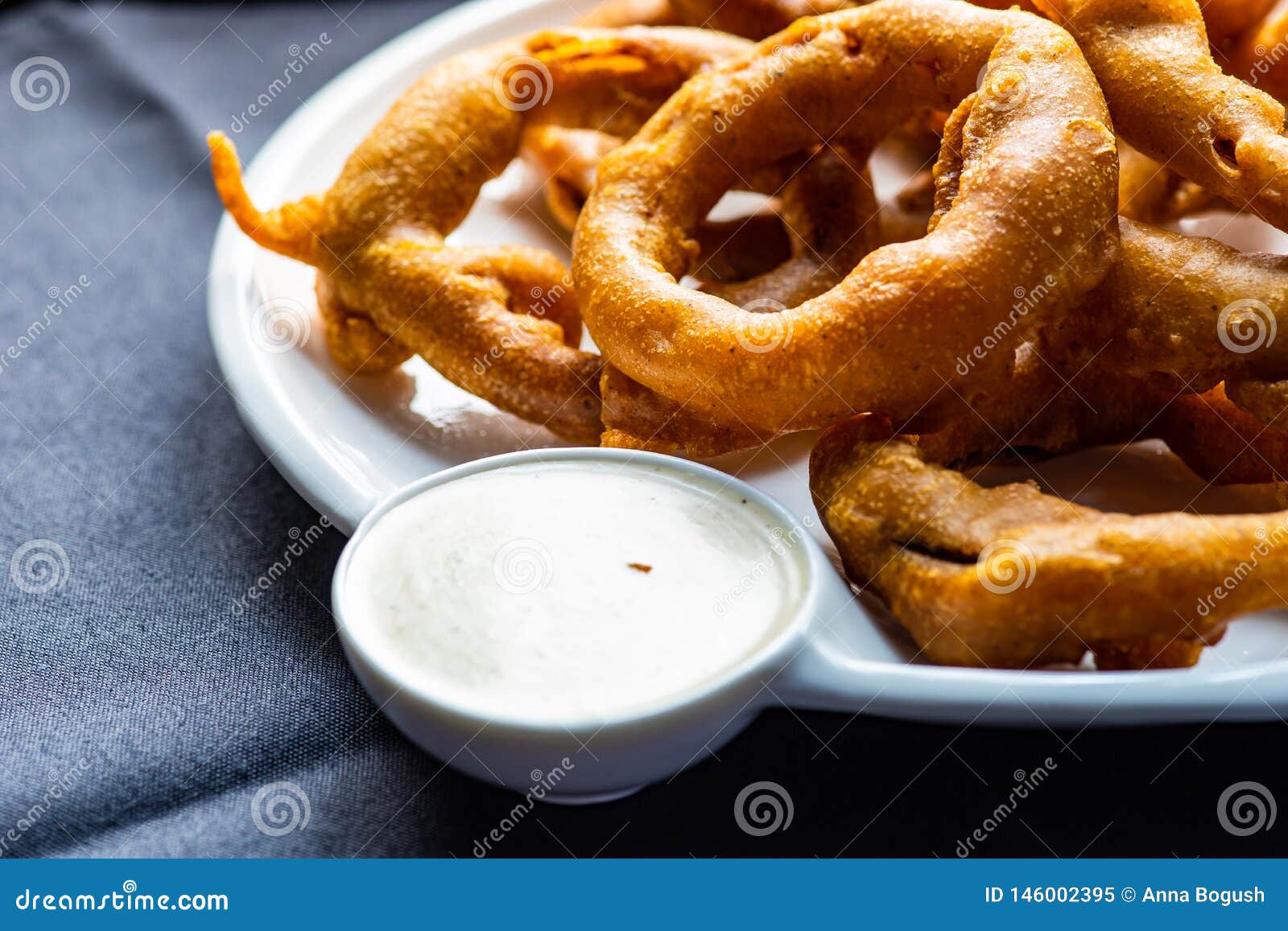 Onion rings on a table stock image. Image of cuisine - 146002395