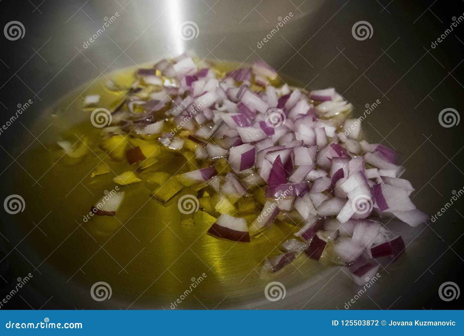 Onion Sizzling in a Pan stock photo. Image of recipe - 125503872