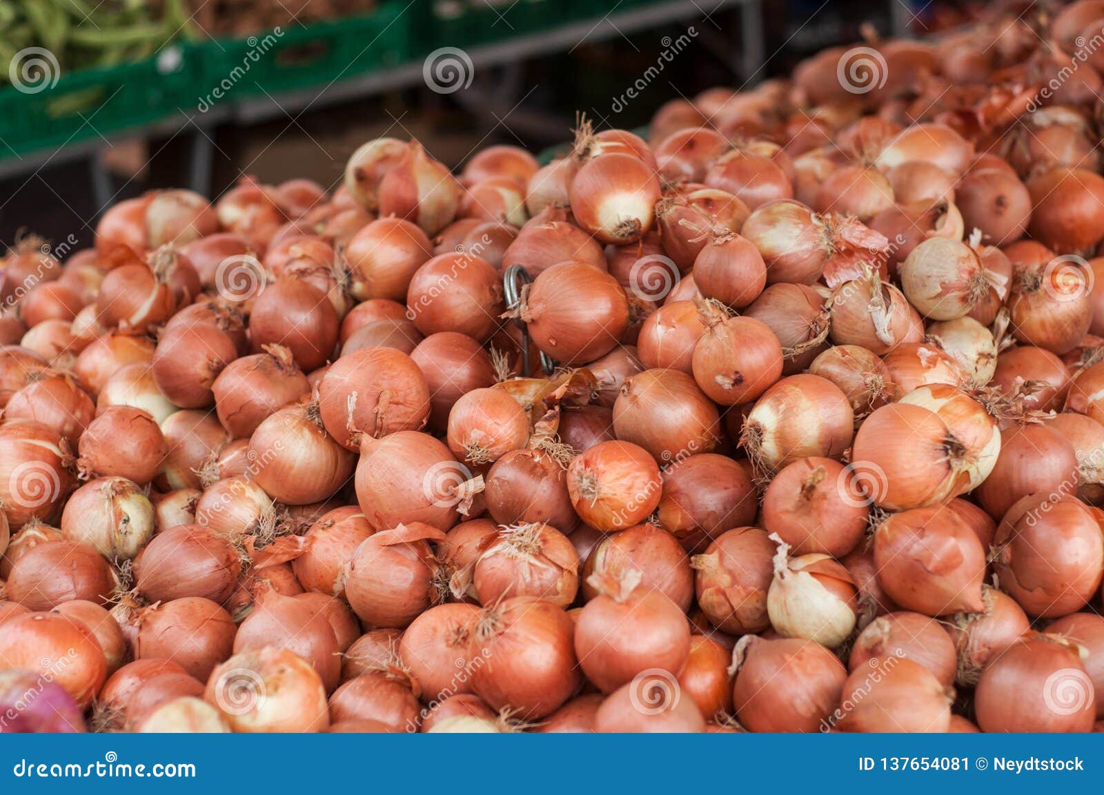 Onions stack at the market stock image. Image of flavor - 137654081