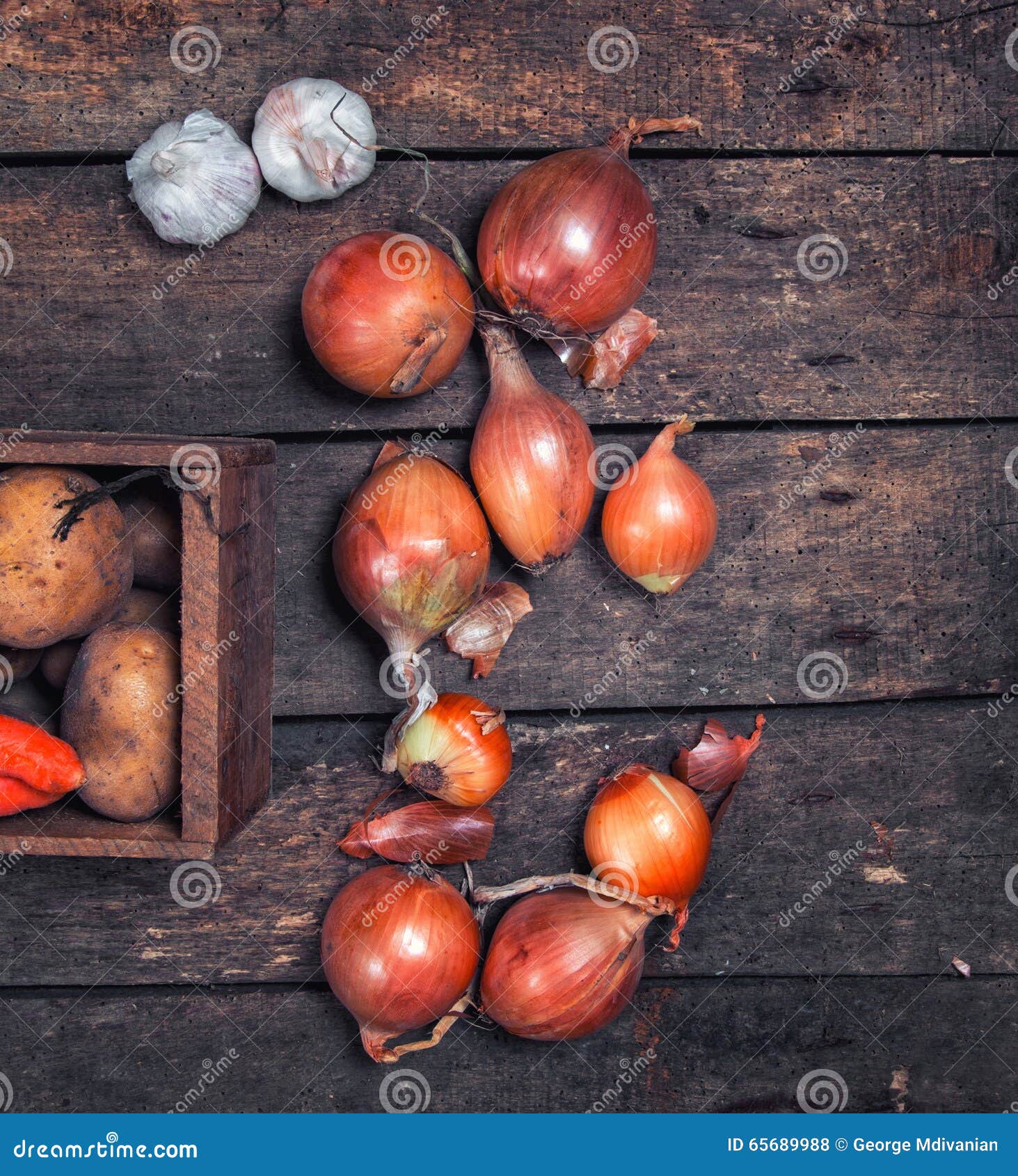 Onions on table stock photo. Image of vegetable, wood - 65689988
