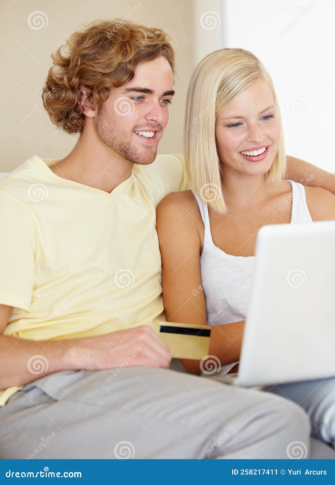 Online Buying Has Never Been Easier A Happy Young Couple Buying Online