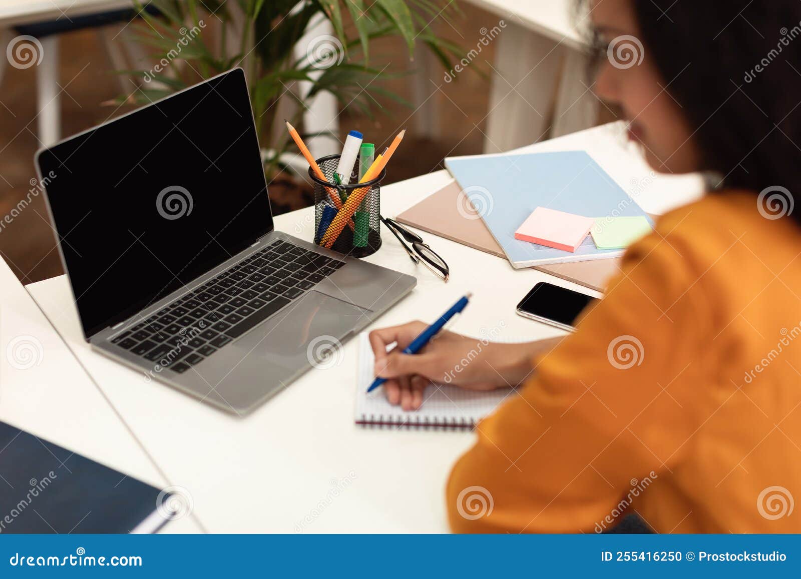 Online Class Concept. Black Female Student Writing in Notebook, Taking ...