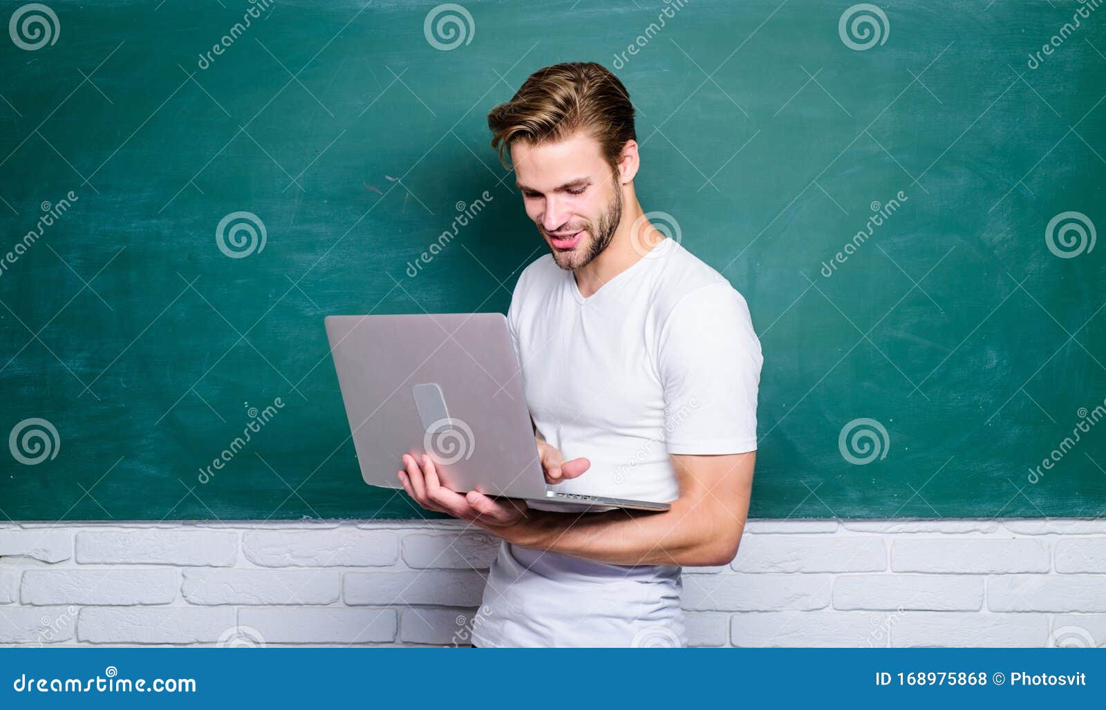 Online Communications. School Teacher with Laptop. Handsome Man Use ...