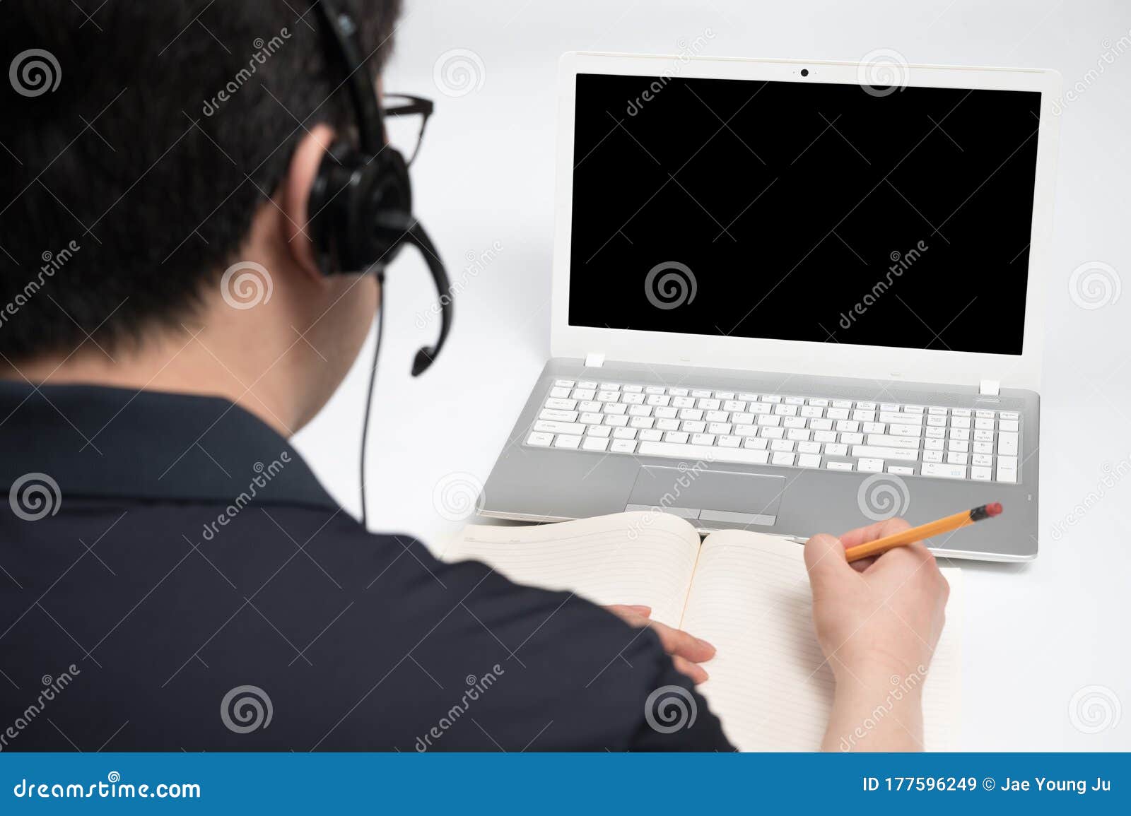 Online Learning Concept. a Man Who is Receiving Online Learning Using a ...