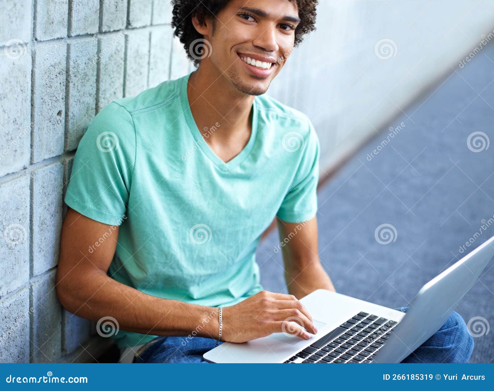 Online Learning is so Convenient. a Young Man Typing on His Laptop and ...