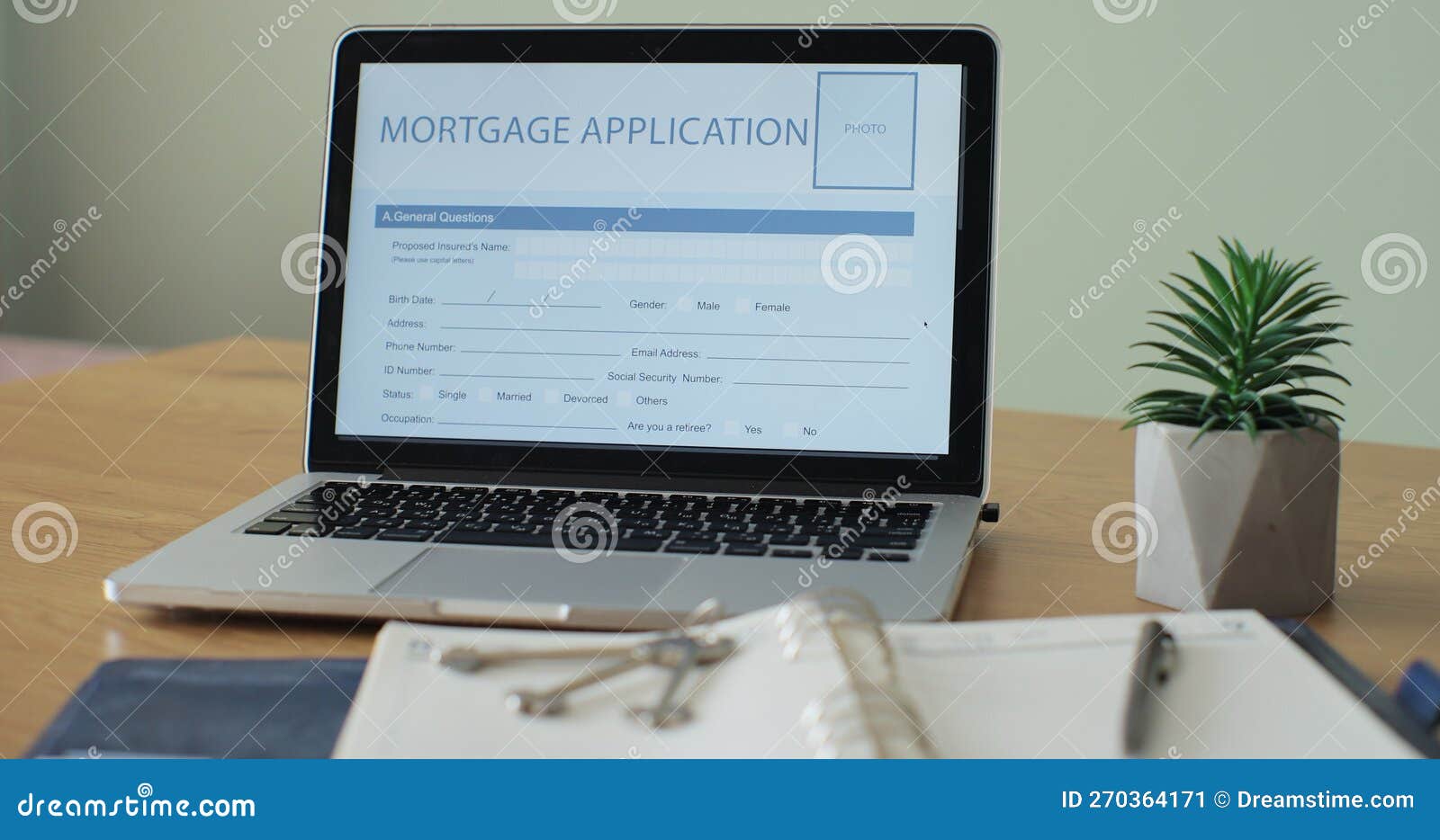 Online Mortgage Application Showing on a Laptop Computer Screen on a ...