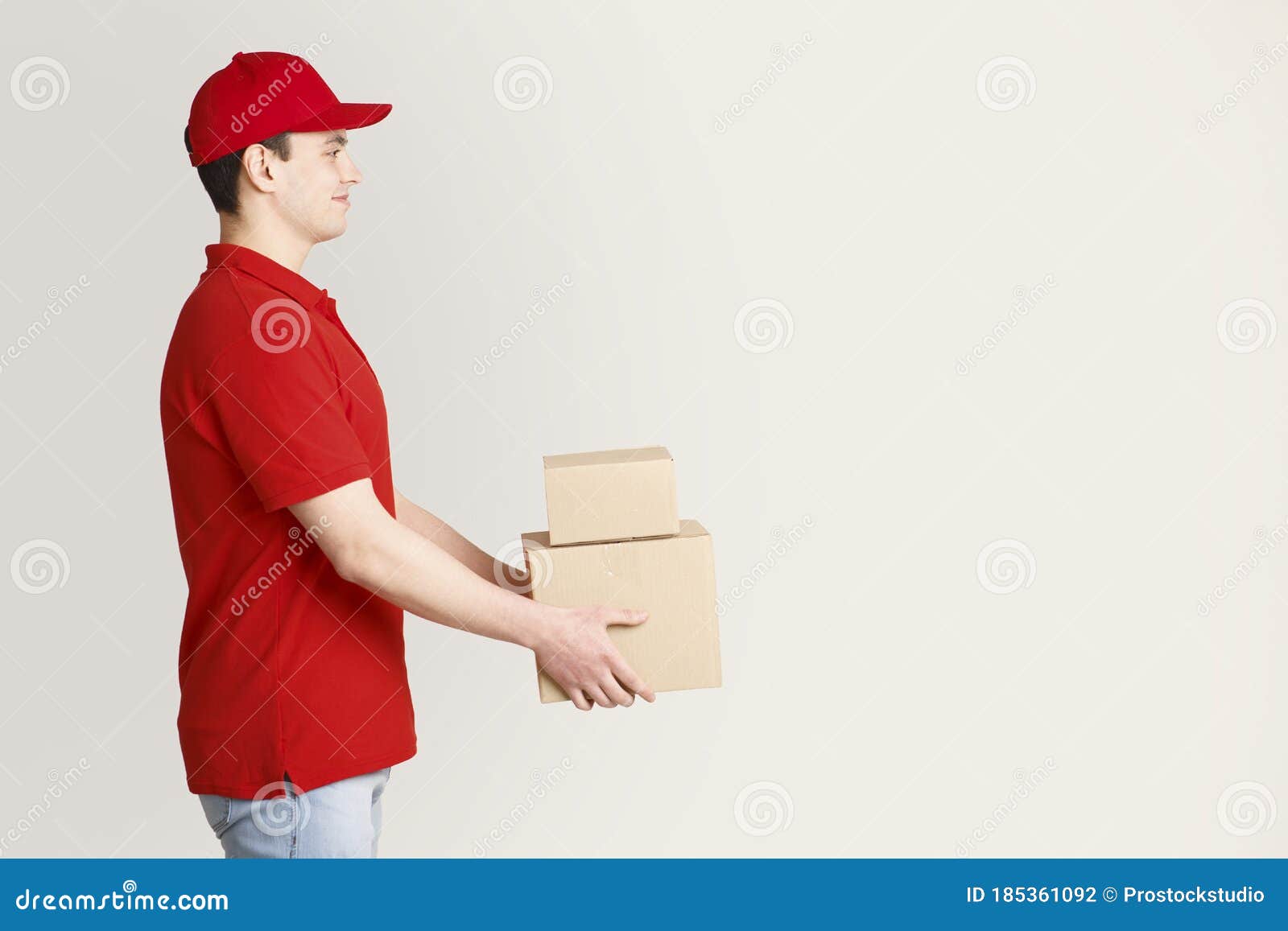 Online Order Received. Courier Gives Cardboard Boxes To Client Stock ...