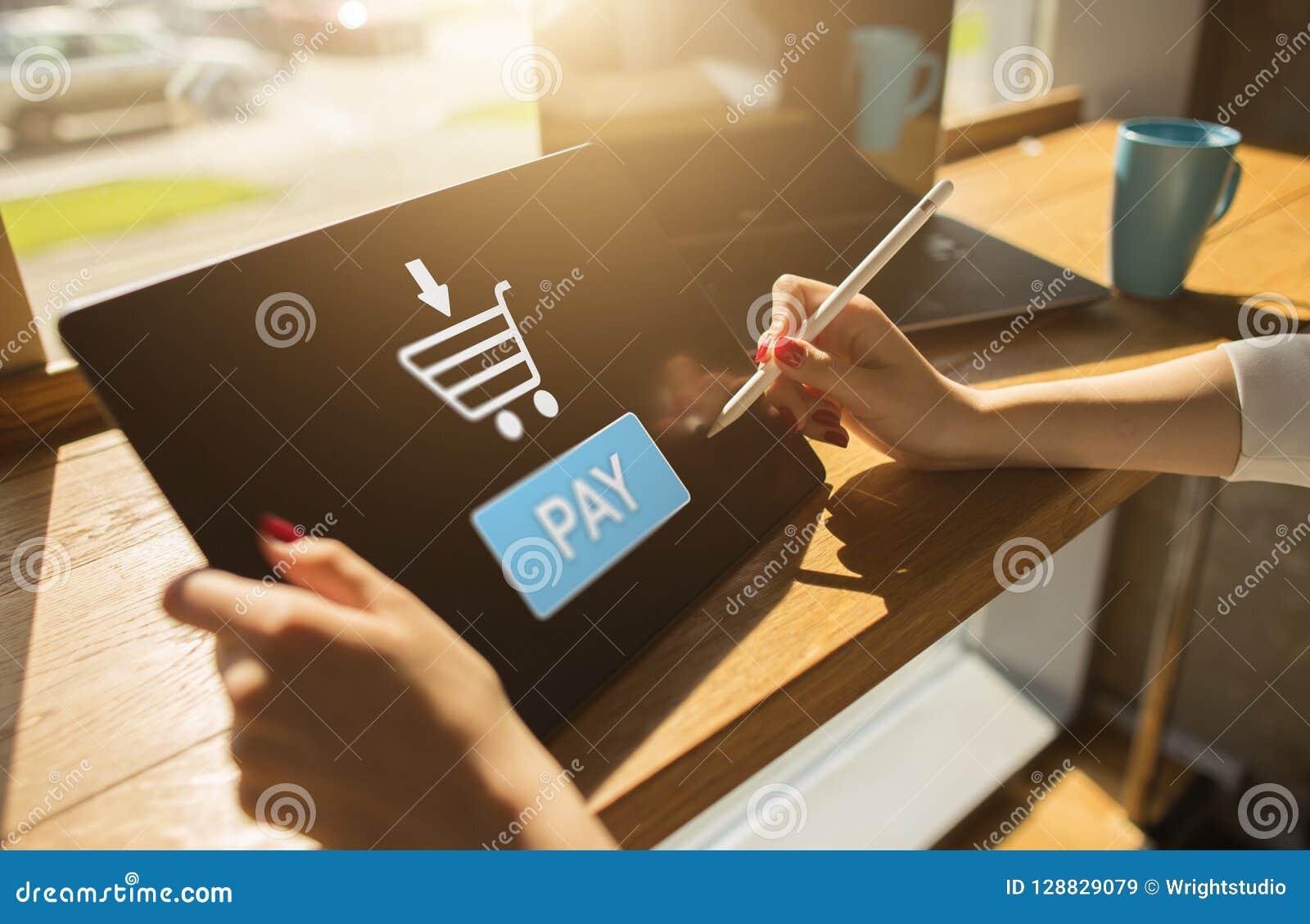 Online Payment an E-commerce Concept. Pay Button on Tablet Screen ...