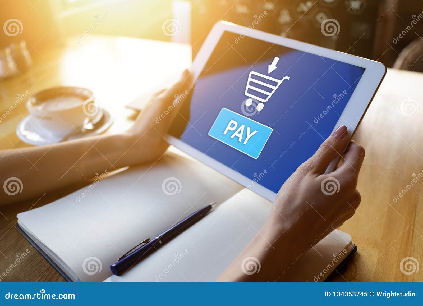 Online Payment an E-commerce Concept. Pay Button on Tablet Screen ...