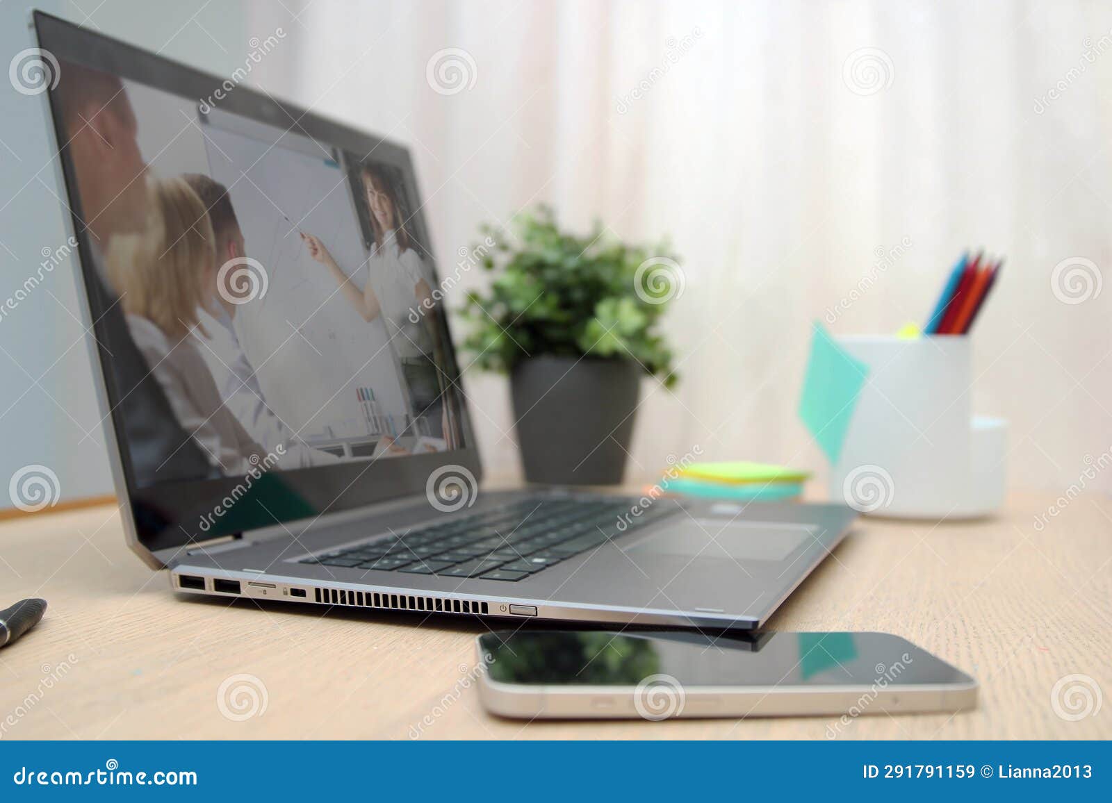 Online Remote Business Presentation is on a Laptop in the Office Stock ...