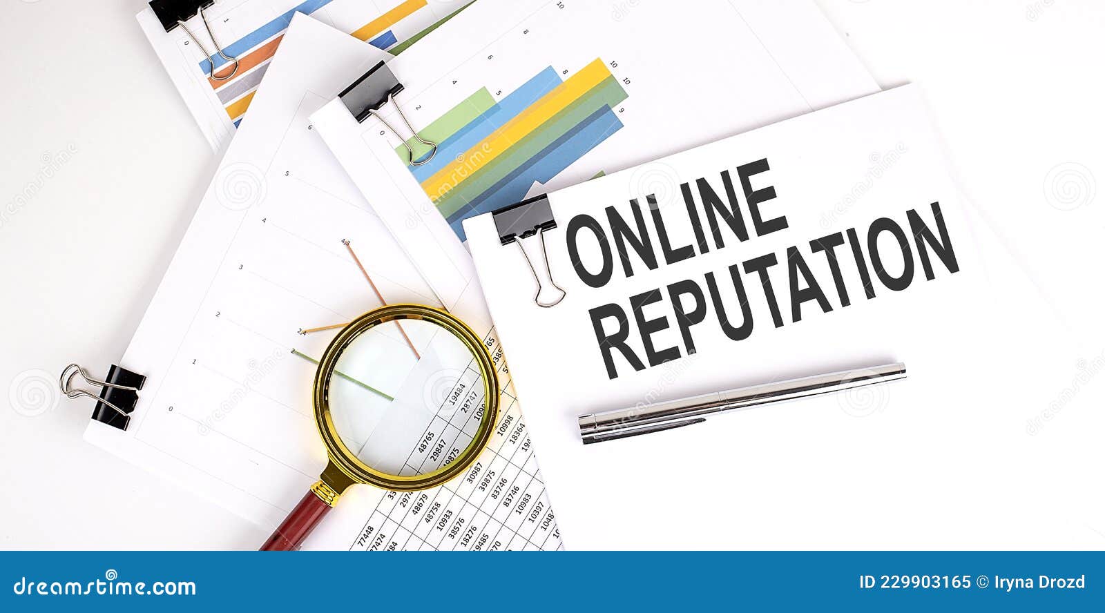 ONLINE REPUTATION Text on White Paper on the Light Background with ...