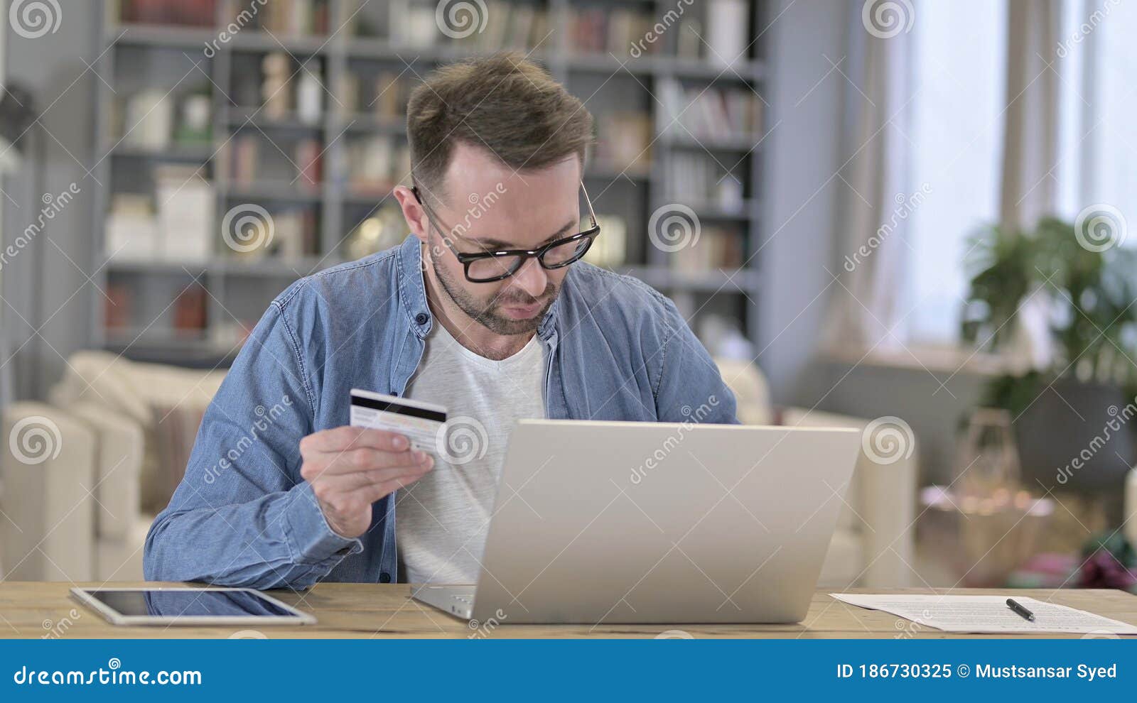 Online Shopping by Man on Laptop Stock Image - Image of buying, white ...