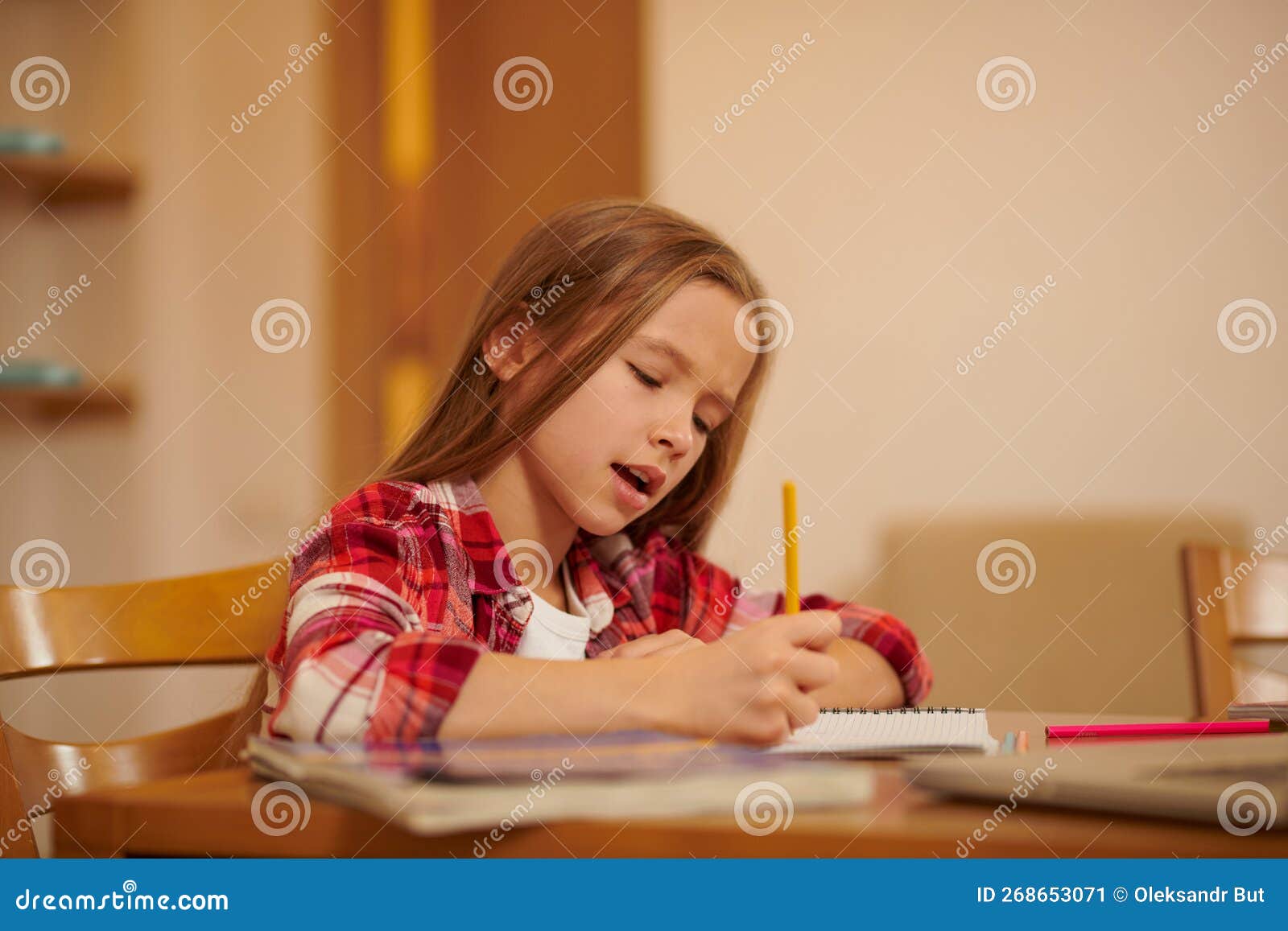 A Cute Long-haired Girl Having an Online Tutorial Stock Image - Image ...