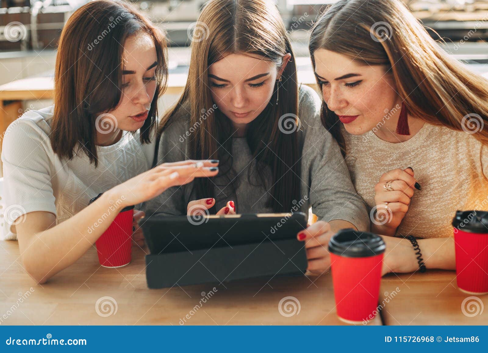 Students Read and Discuss Their Task at Tablet Pc Stock Photo - Image ...