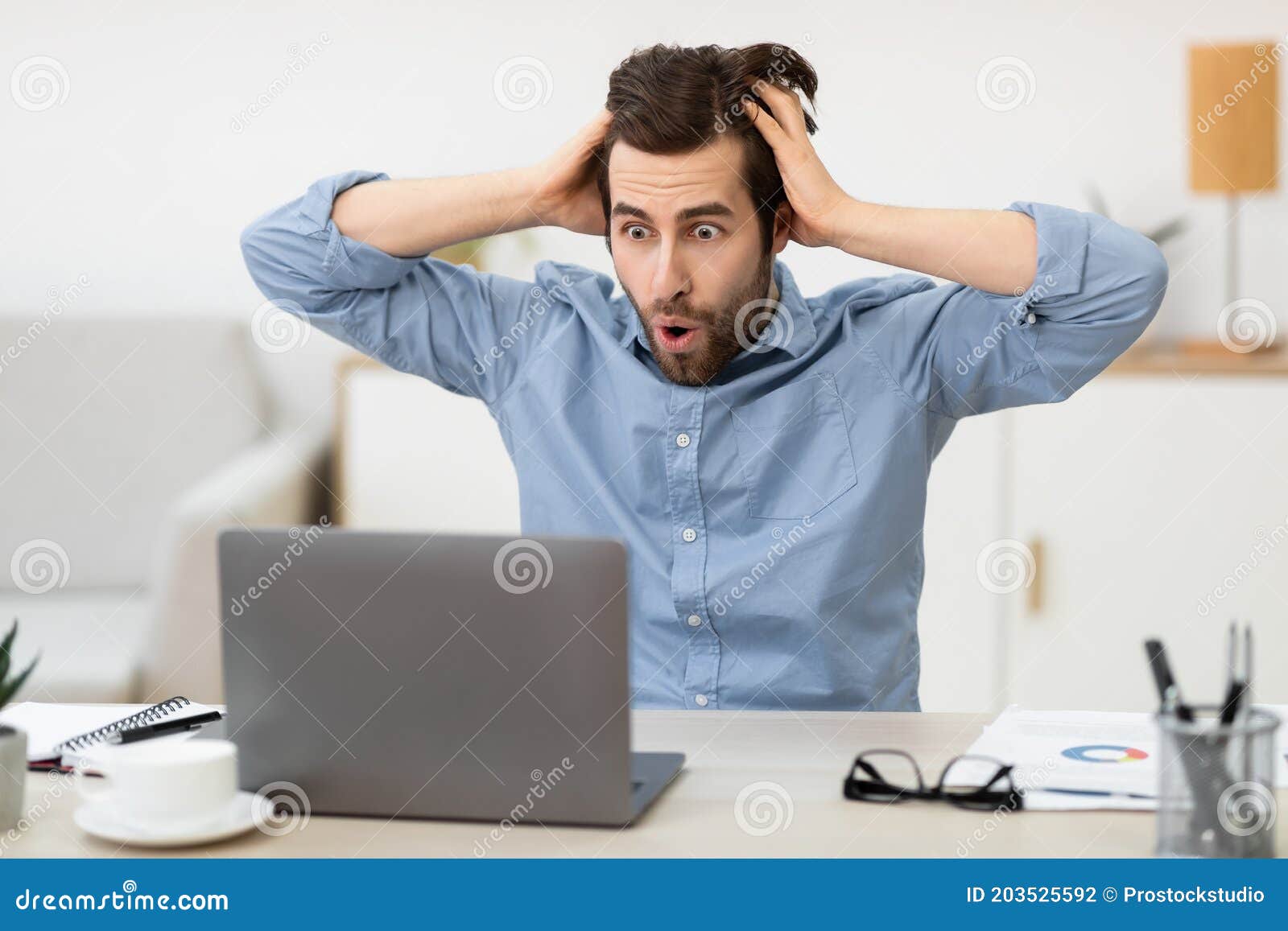 Shocked Frustrated Businessman Looking at Laptop Touching Head at ...