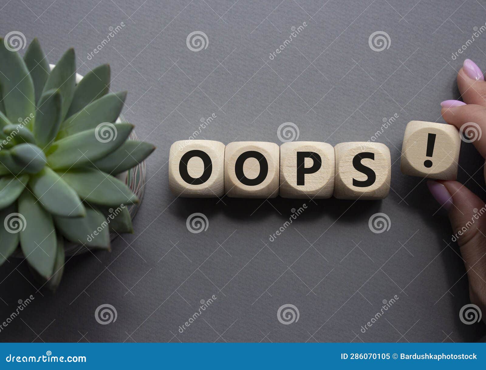 Oops Symbol Concept Word Oops On Wooden Cubes Beautiful Blue