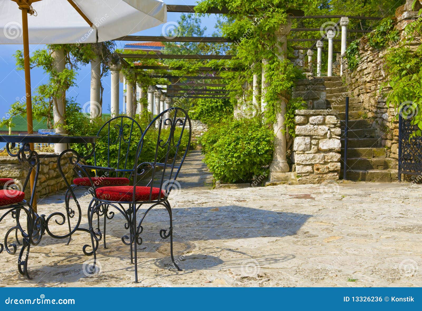 Open-air Cafe on Winded Around Green Terrace Stock Photo - Image of ...