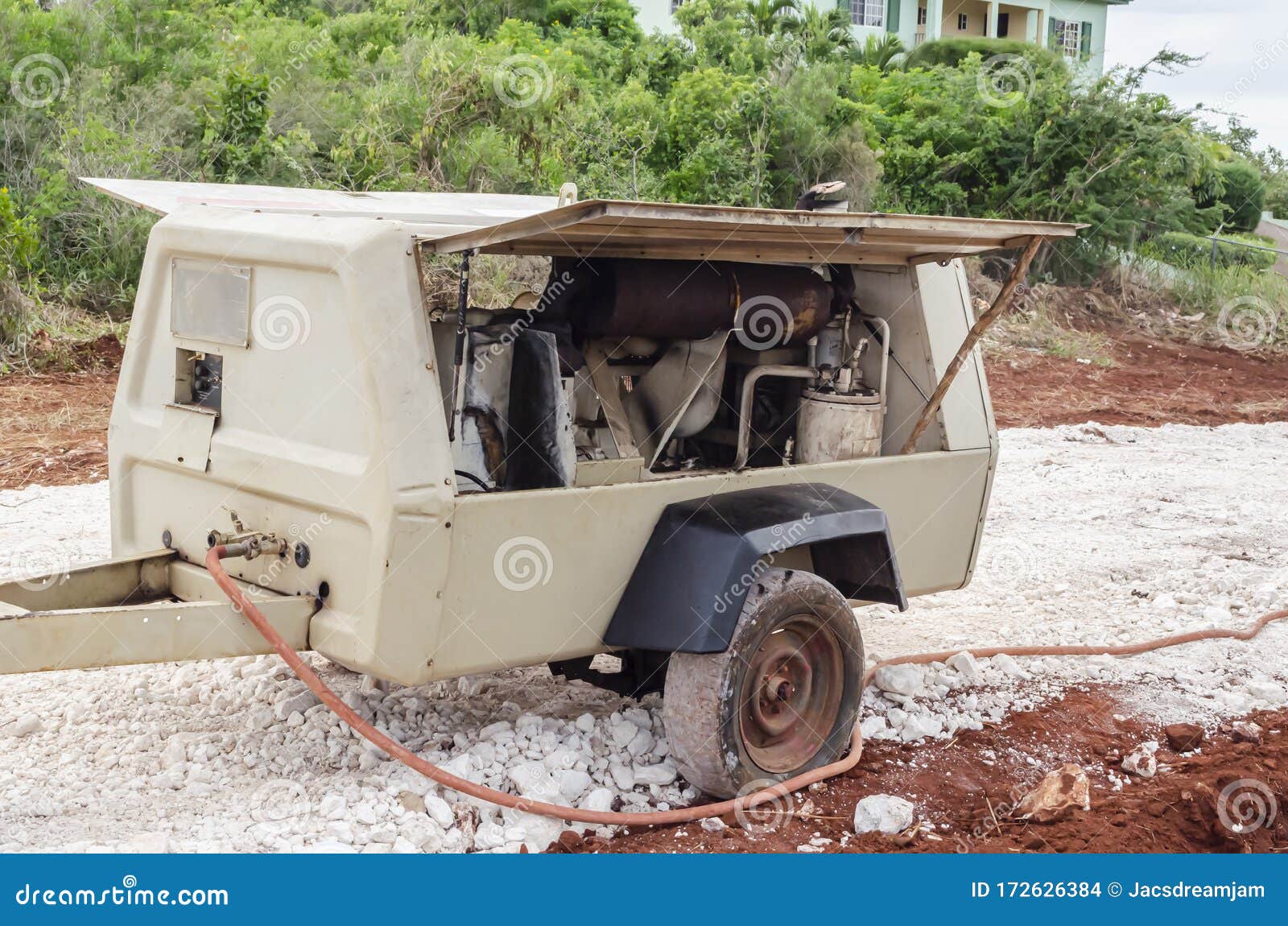 Air Compressor on Road Construction Site Stock Photo - Image of muffler ...